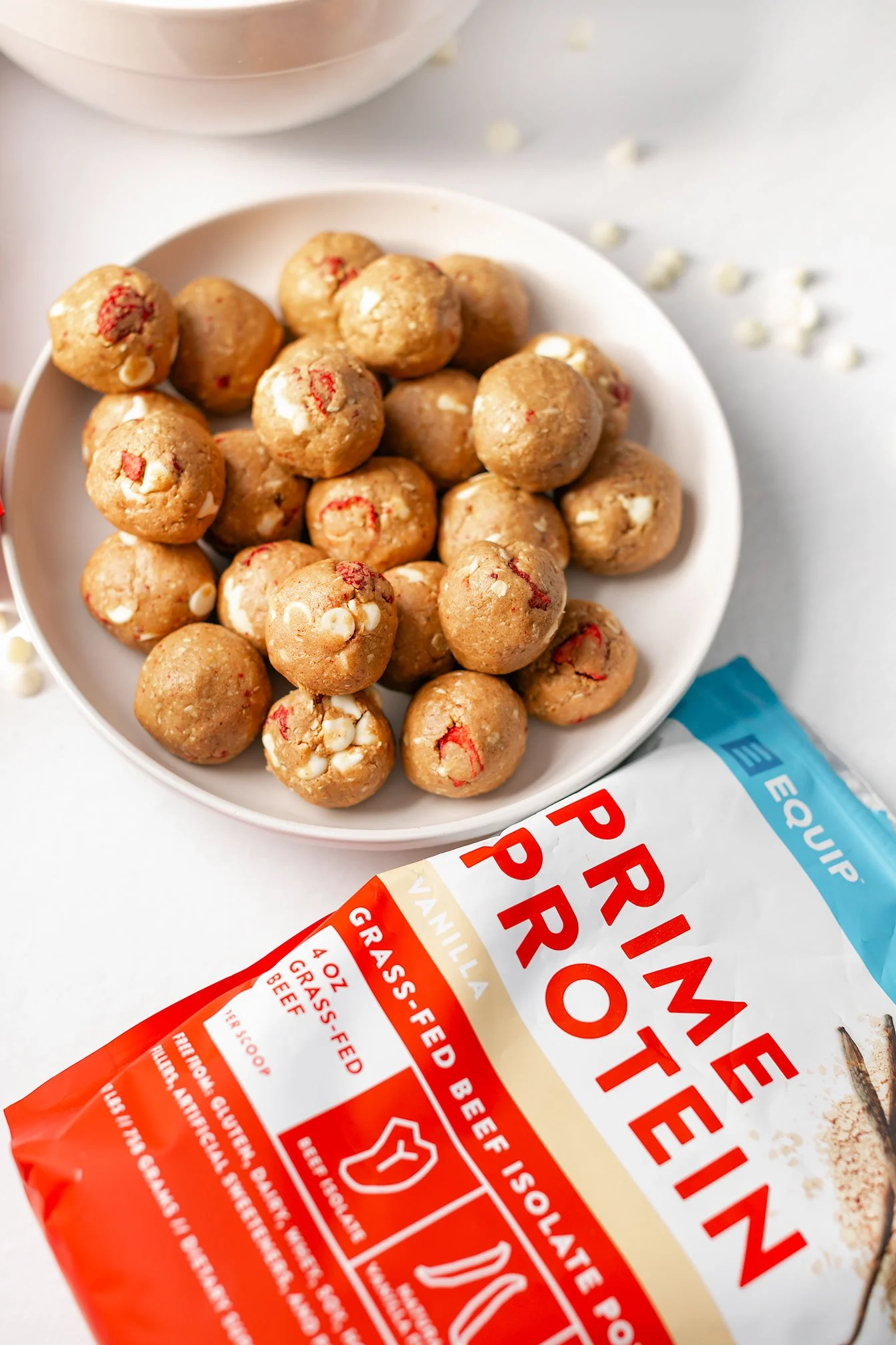Strawberry Cheesecake Protein Balls | From the Roots