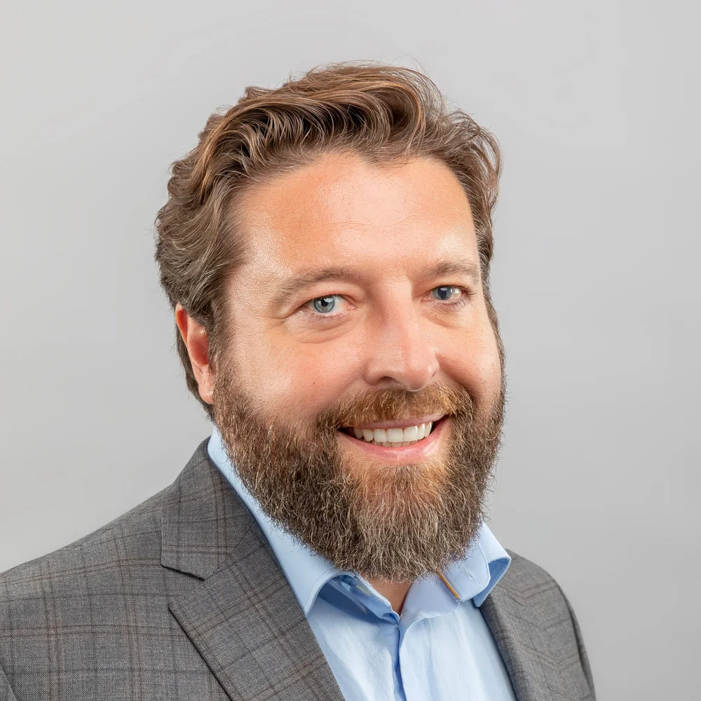 Our Team — Prism Economics and Analysis