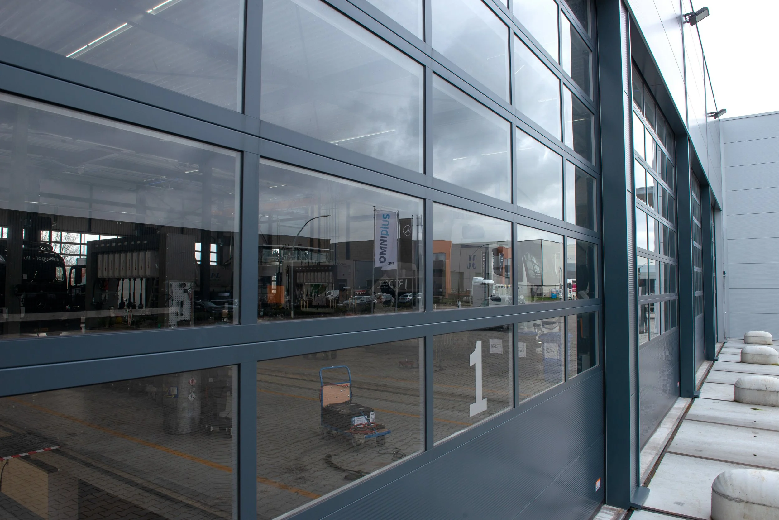 Insulated Sectional Doors — PENSA