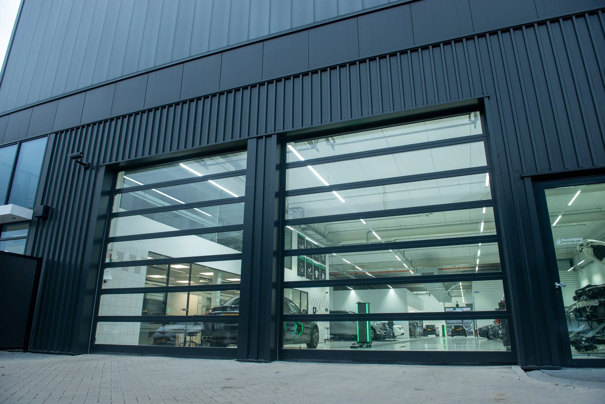 Insulated Sectional Doors — PENSA