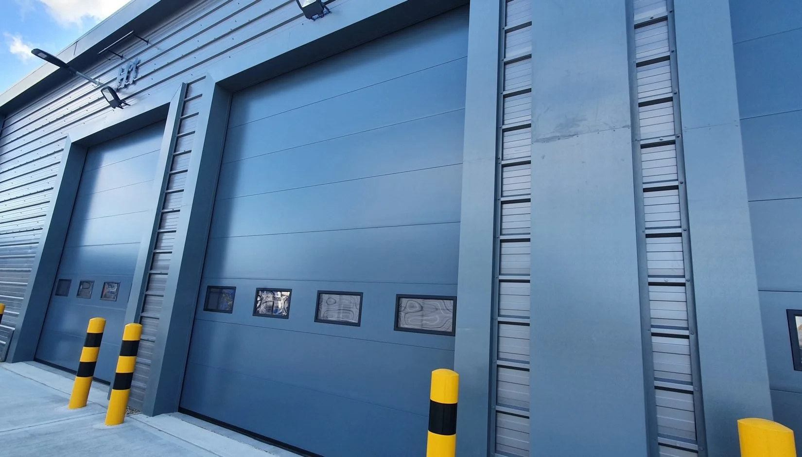 Insulated Sectional Doors — PENSA
