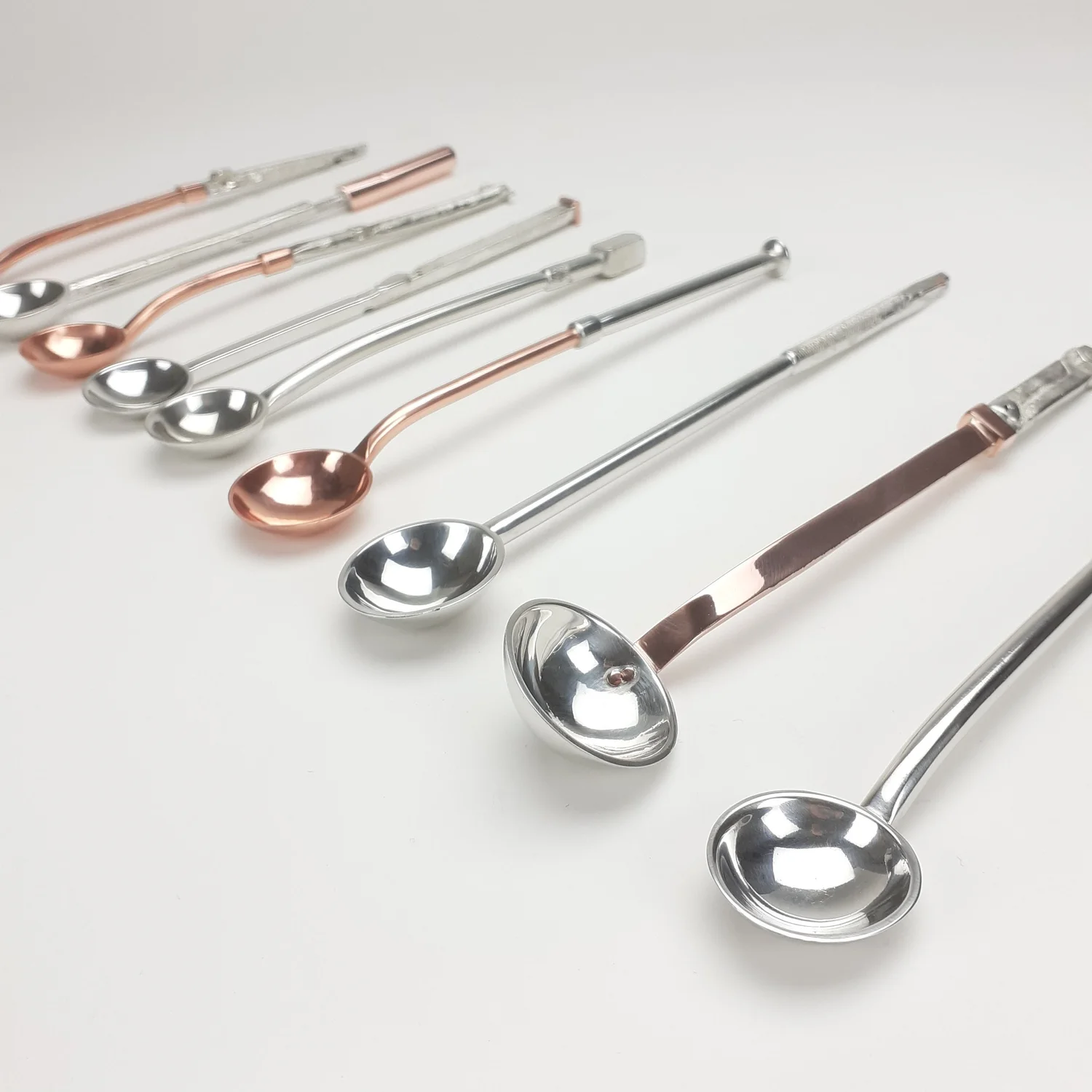Contemporary pewter and copper spoons, serving spoons, tableware ...