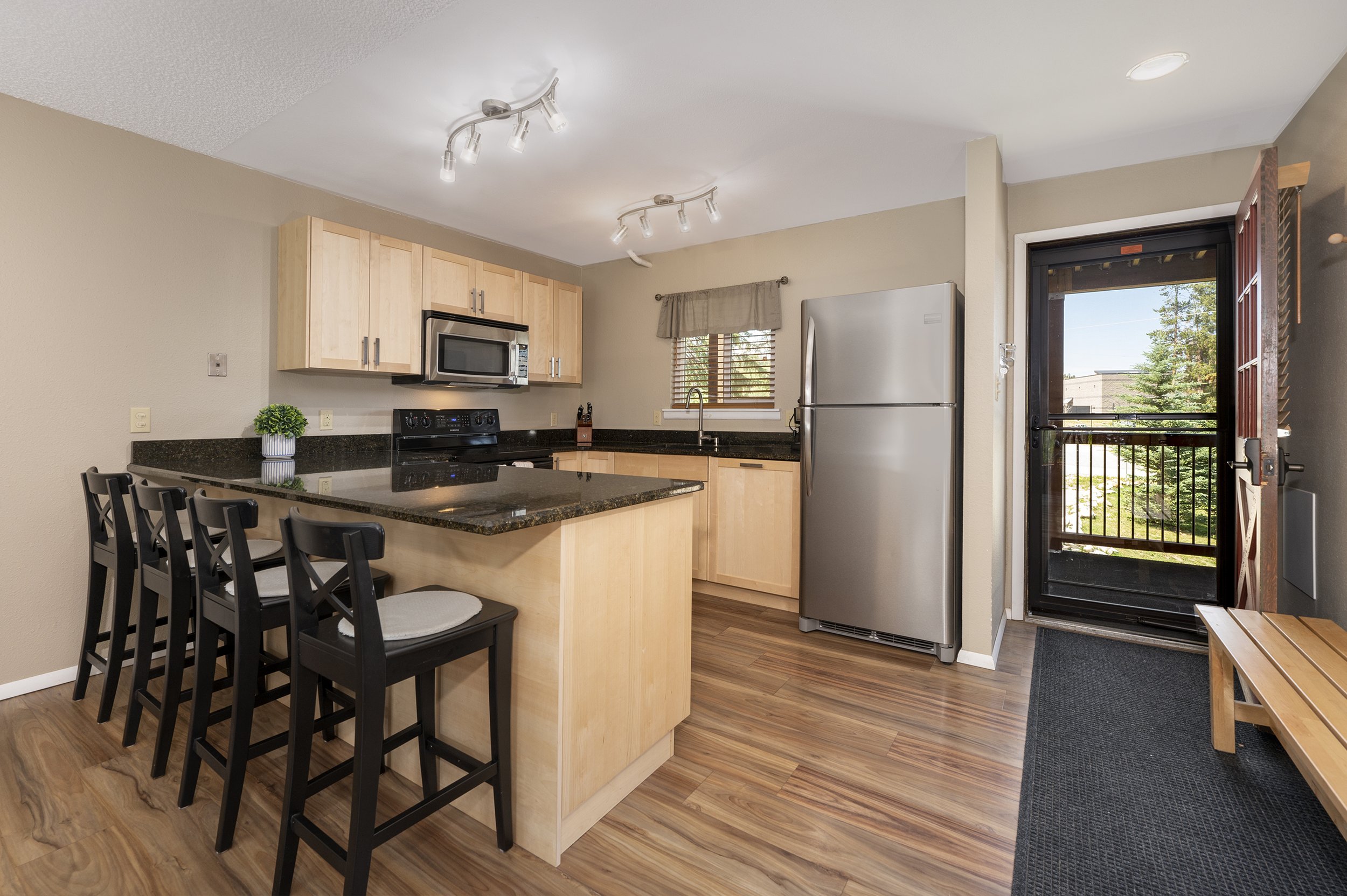 Just Listed: On the river in Hi Country Haus — West + Main