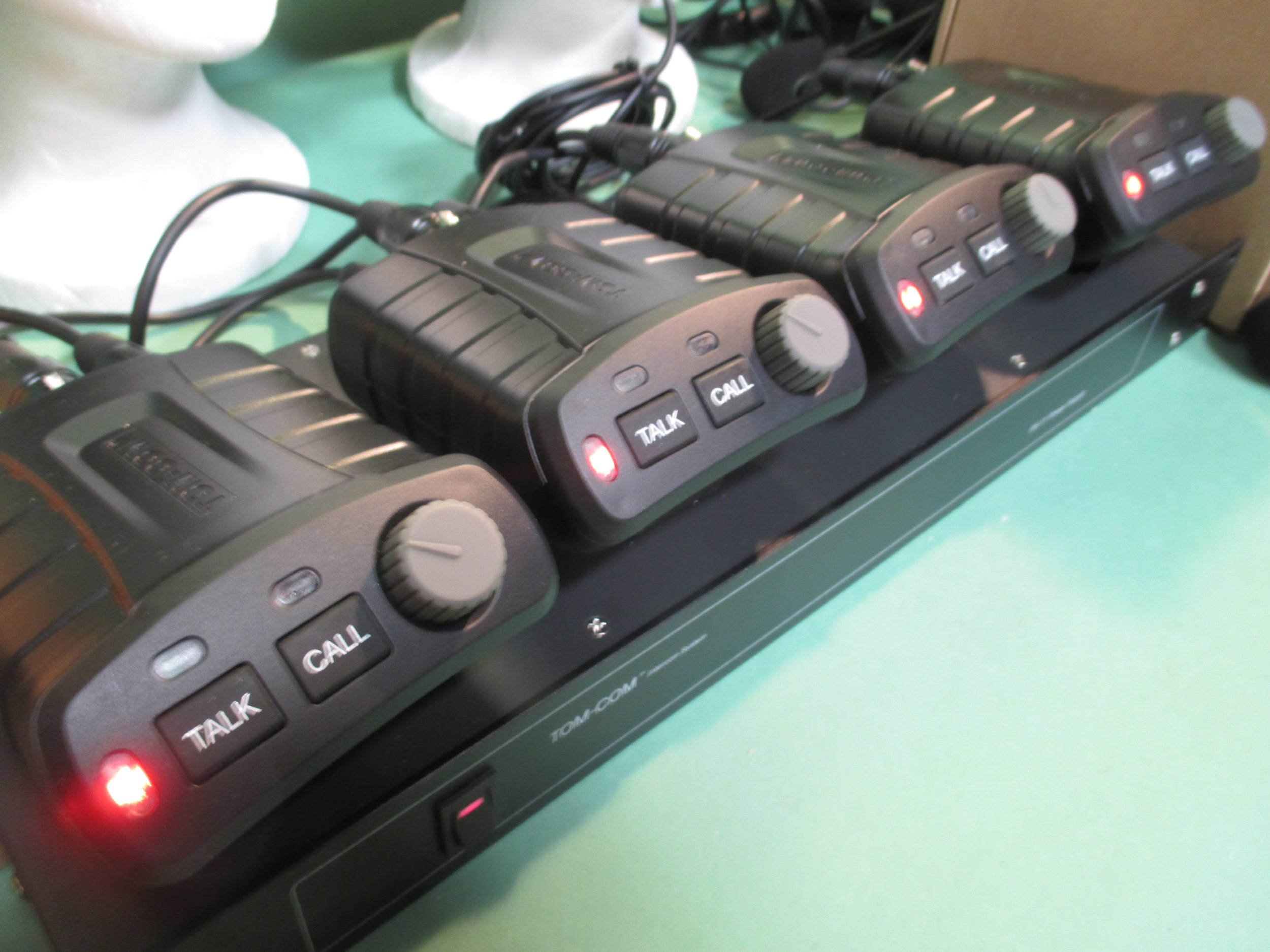 Tom-Com — T. H. E. Company