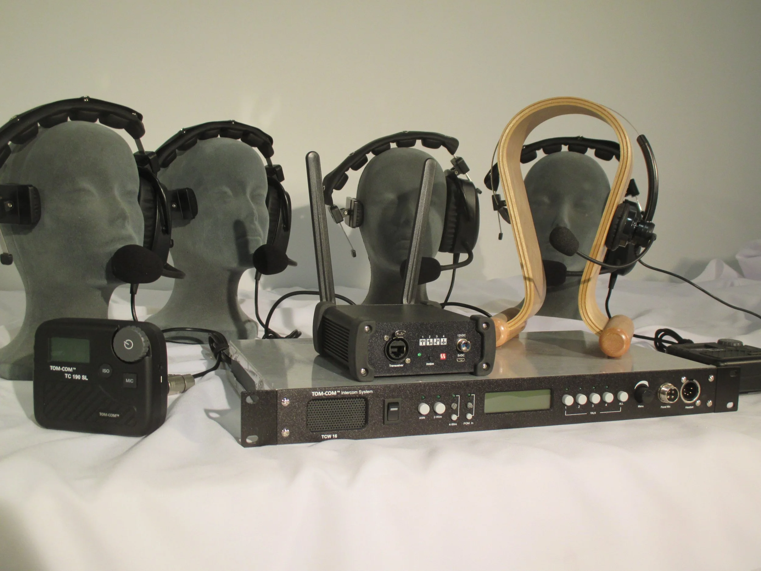 Tom-Com — T. H. E. Company