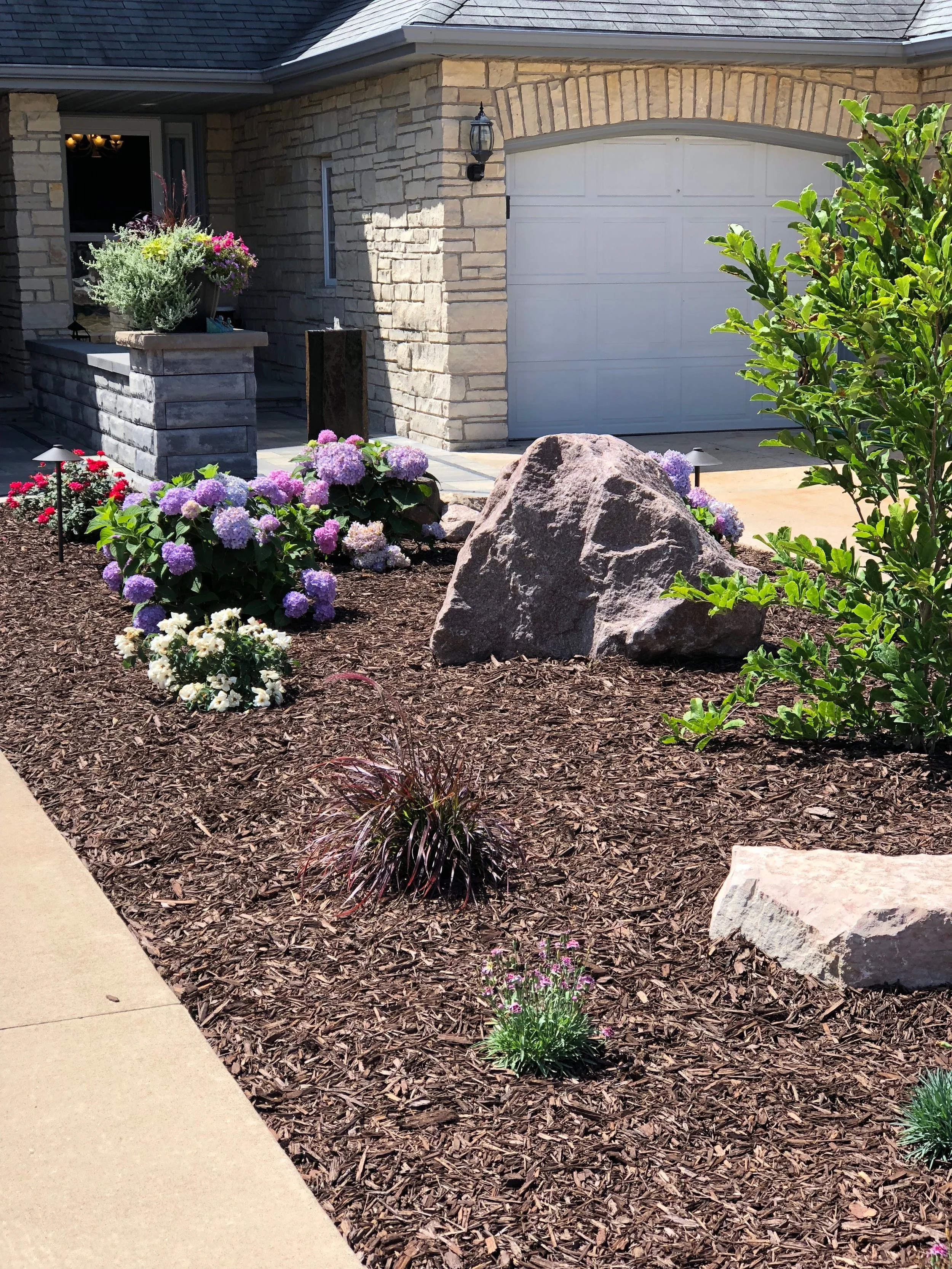 Vosters Landscaping, Inc.