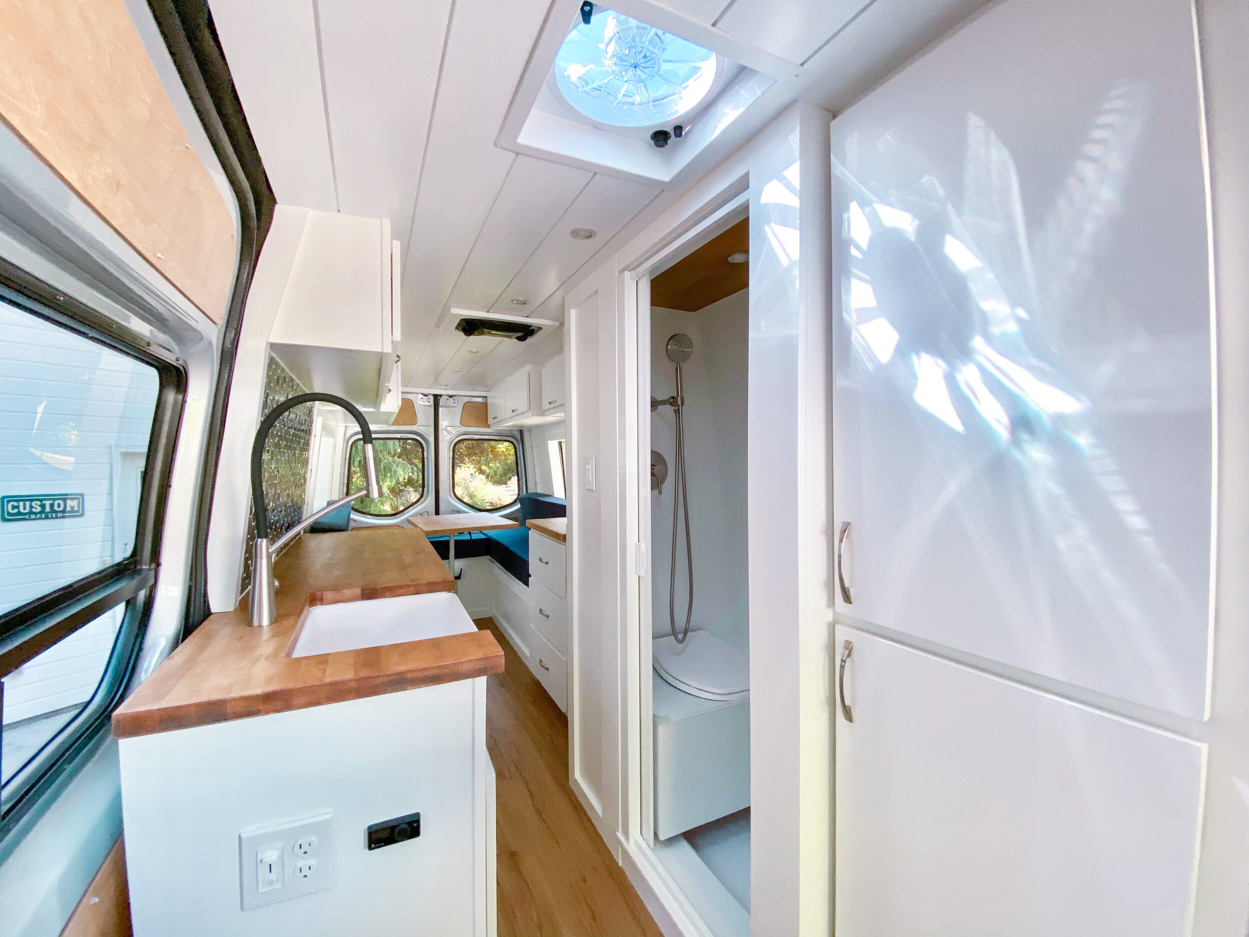 Beach House — Custom Crafted Vans | Luxury Custom Van Conversions
