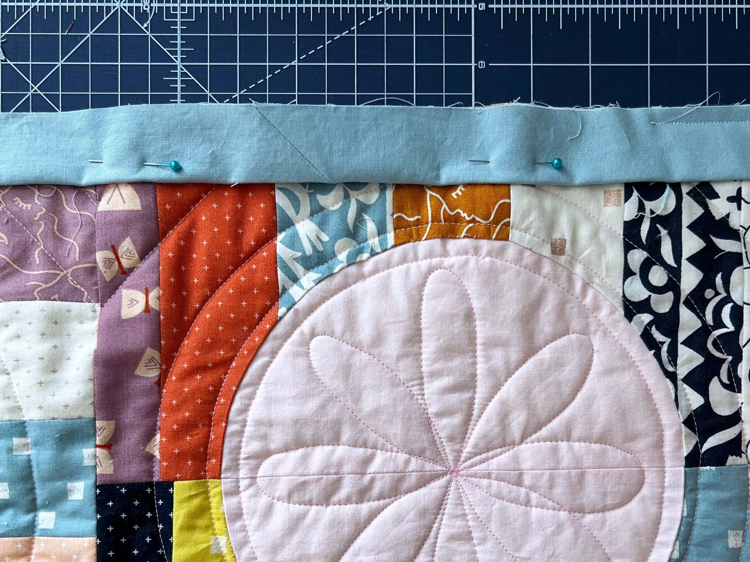 Binding a Quilt — Megan Collins