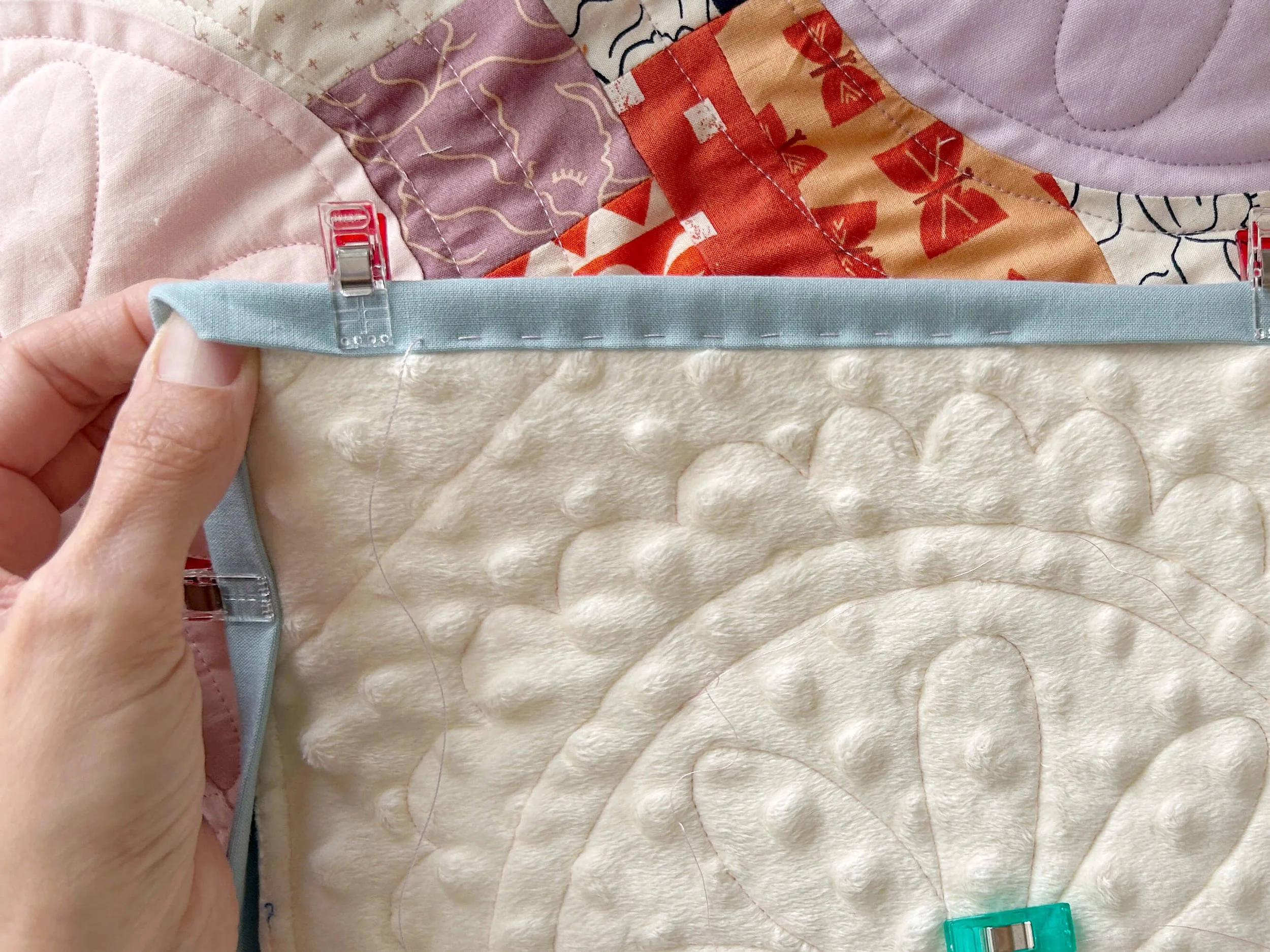 Binding a Quilt — Megan Collins