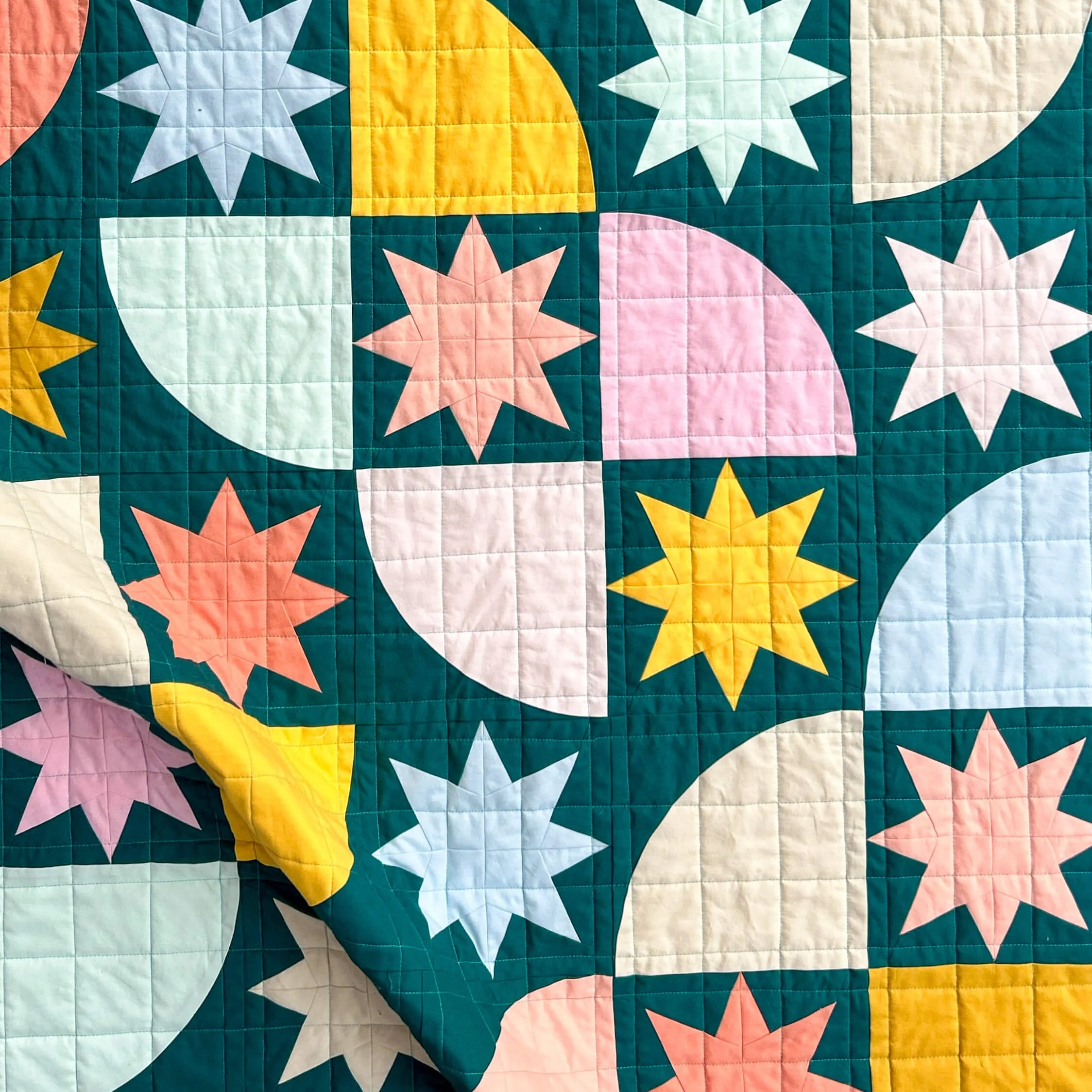 The Spark Quilt: A Burst of Color and Curves — Megan Collins Quilt Design