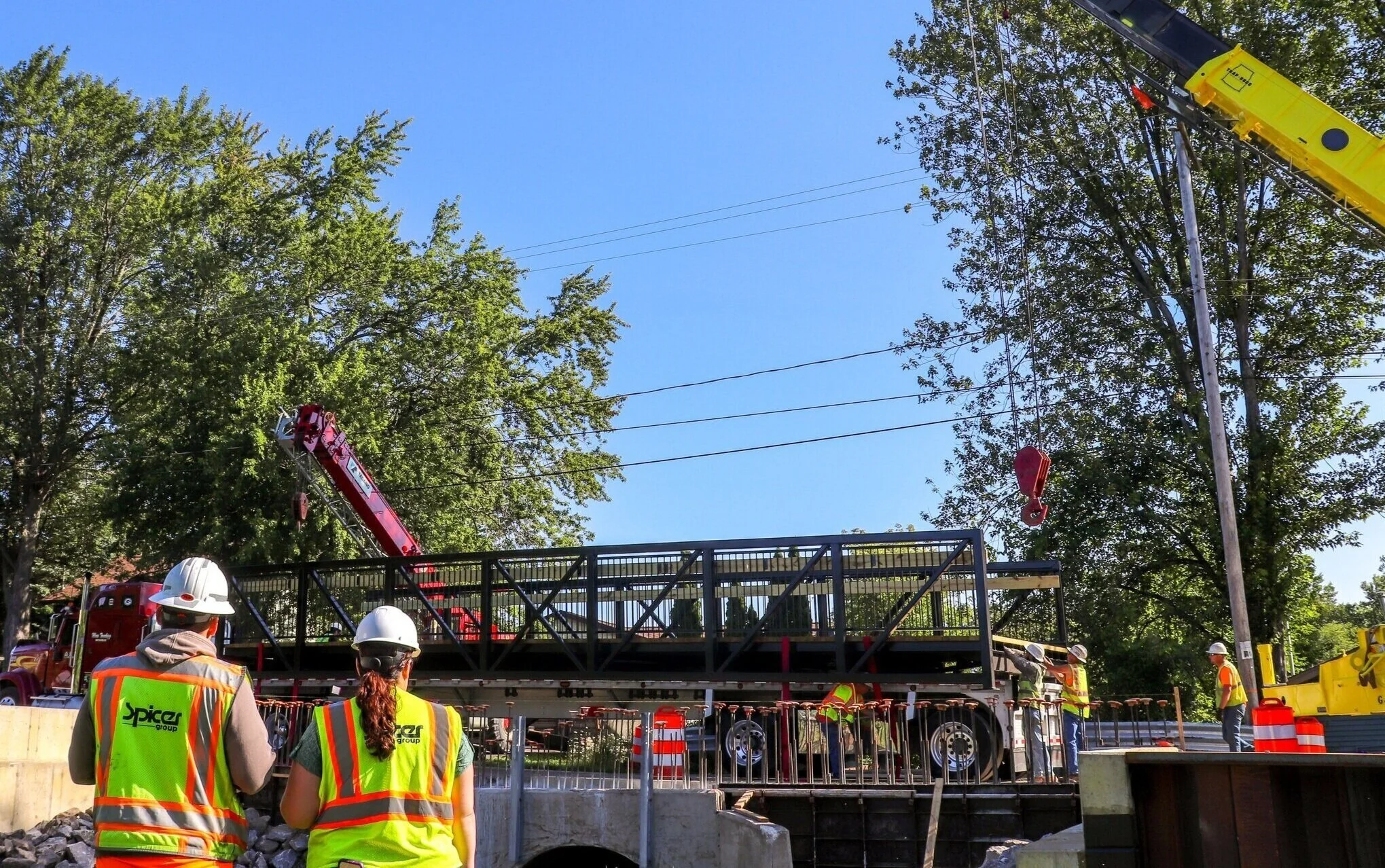 ABOUT — Spicer Group