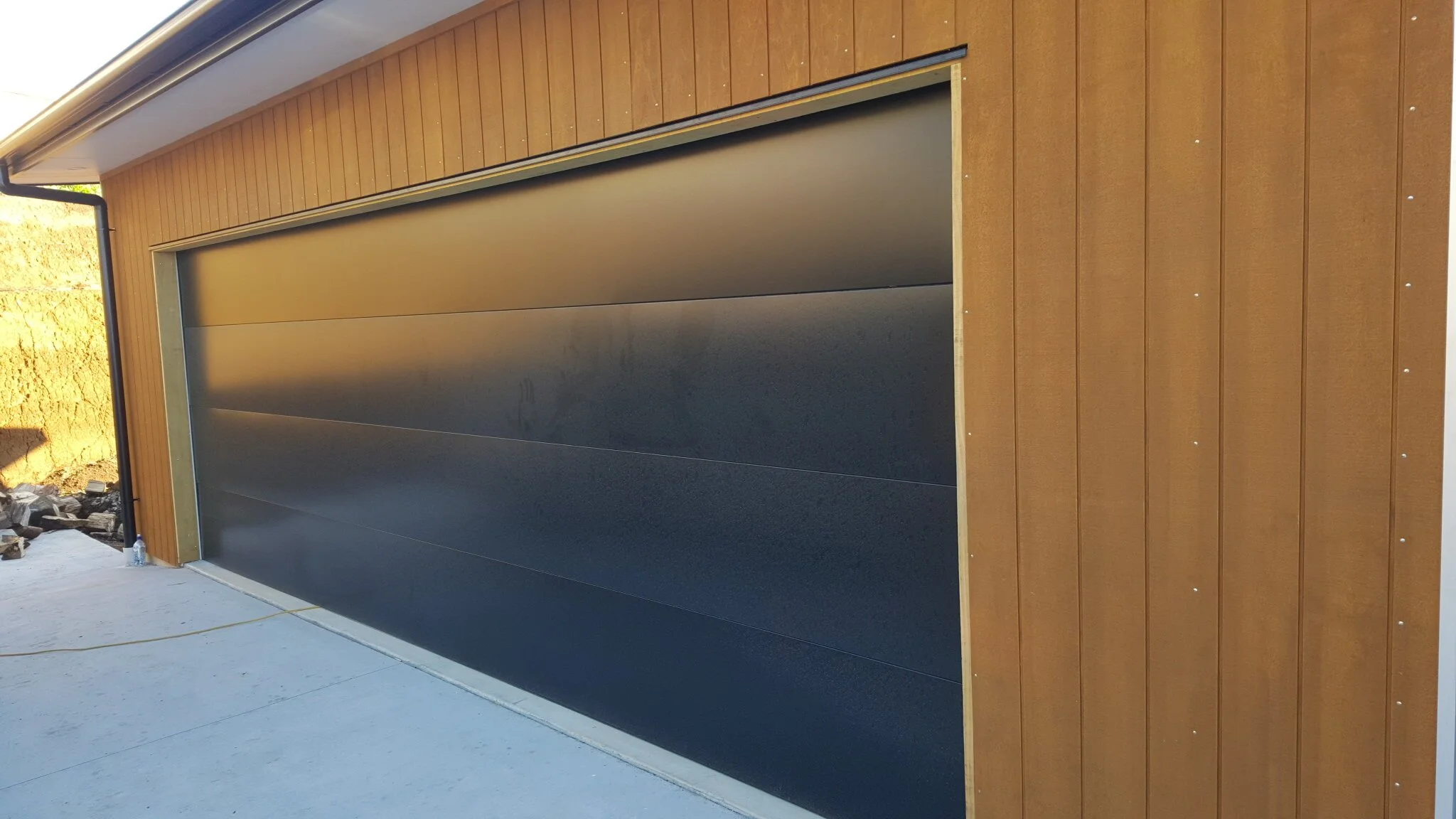 Beautifully Crafted, New Zealand Made Sectional Garage Doors — Alpha Doors