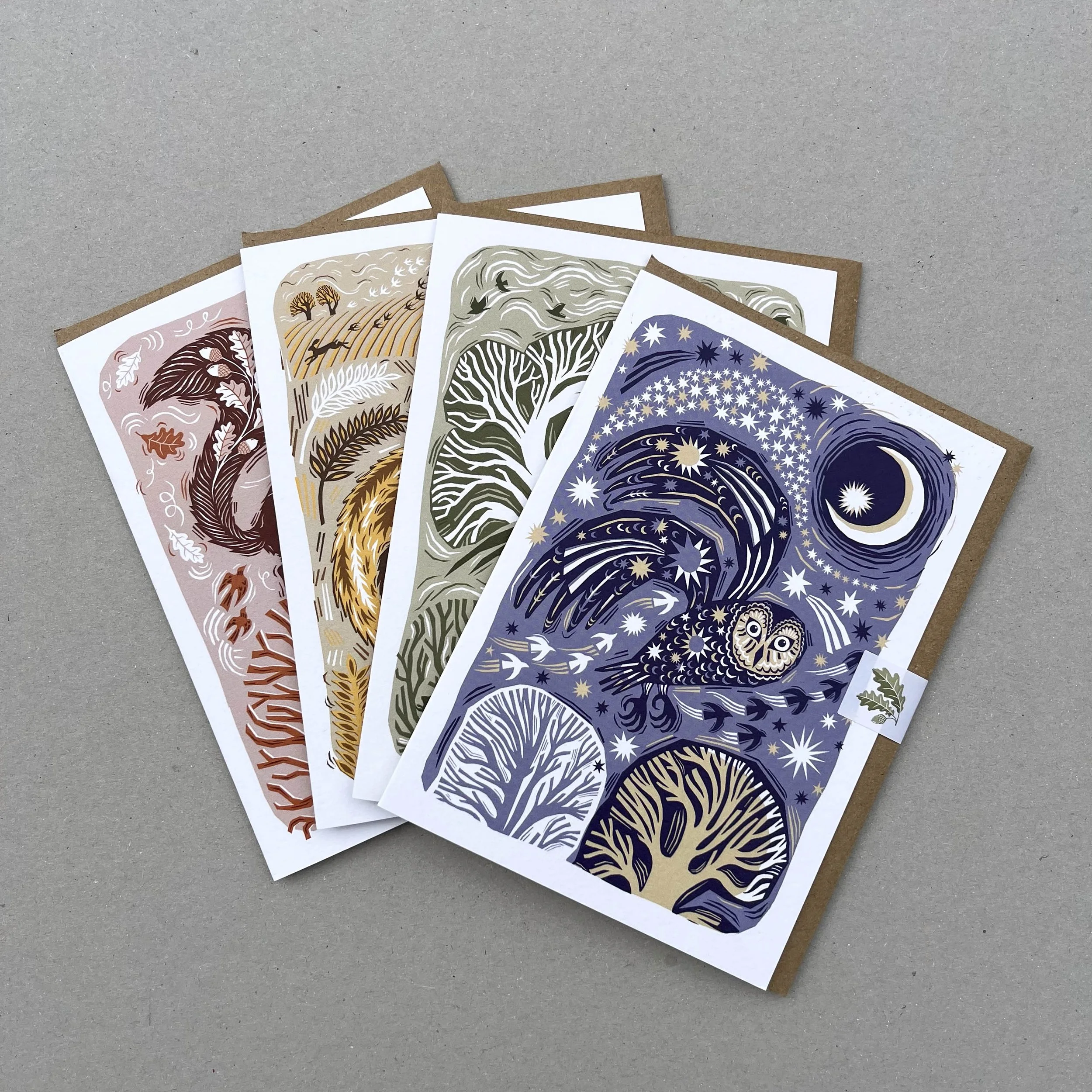 A greetings card featuring a swooping midnight owl, his feathers filled ...