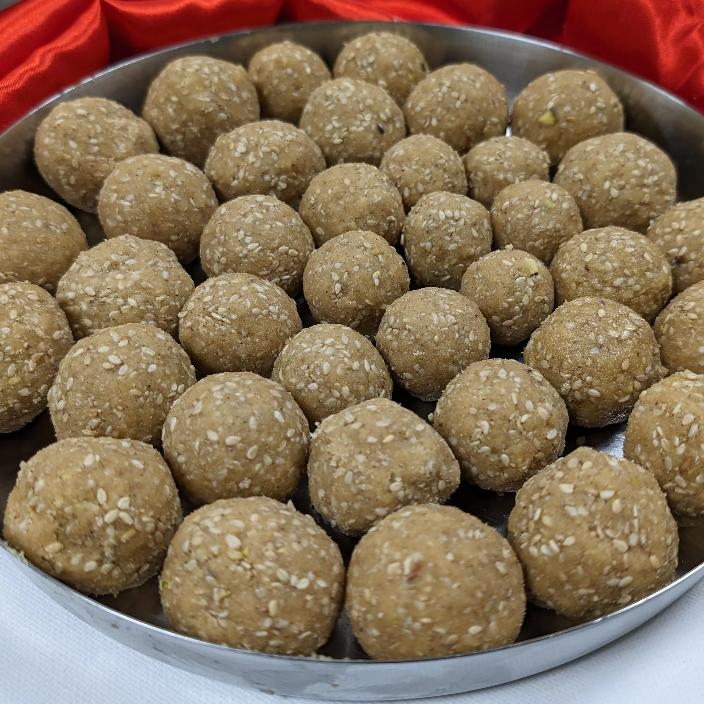 Homemade Til Atta Ladoo Recipe — Chhaya's Food