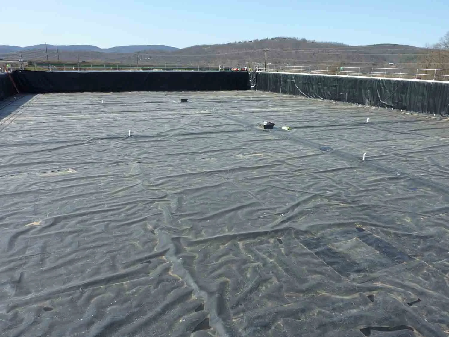 FLOATING COVER — Chenango Contracting Inc.