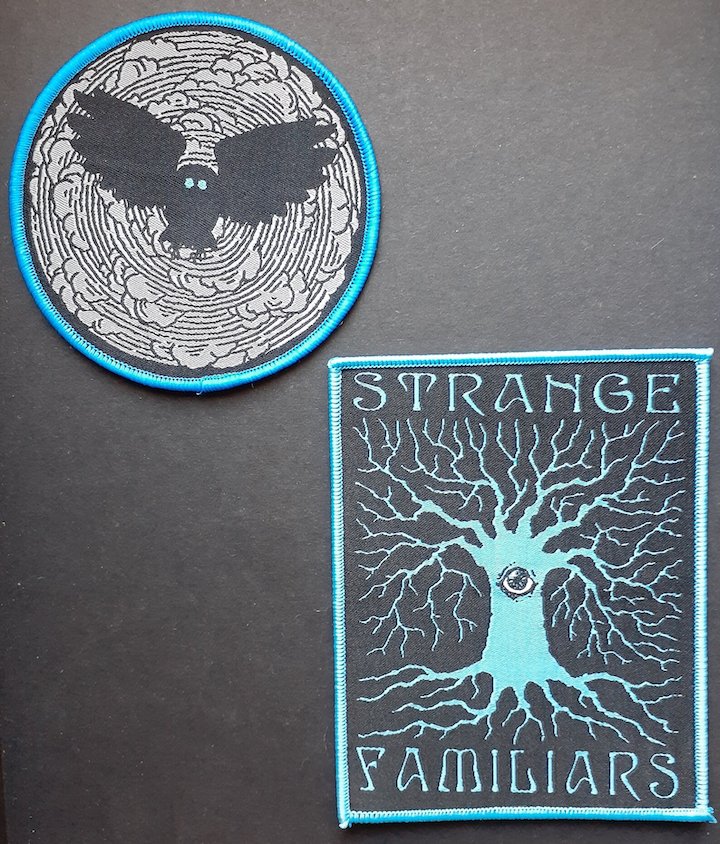 MERCH — Strange Familiars