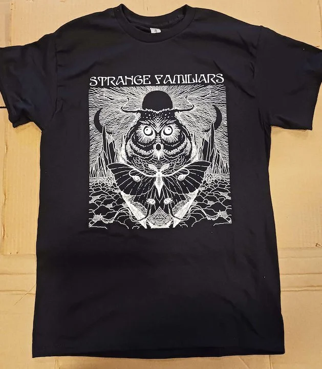 MERCH — Strange Familiars