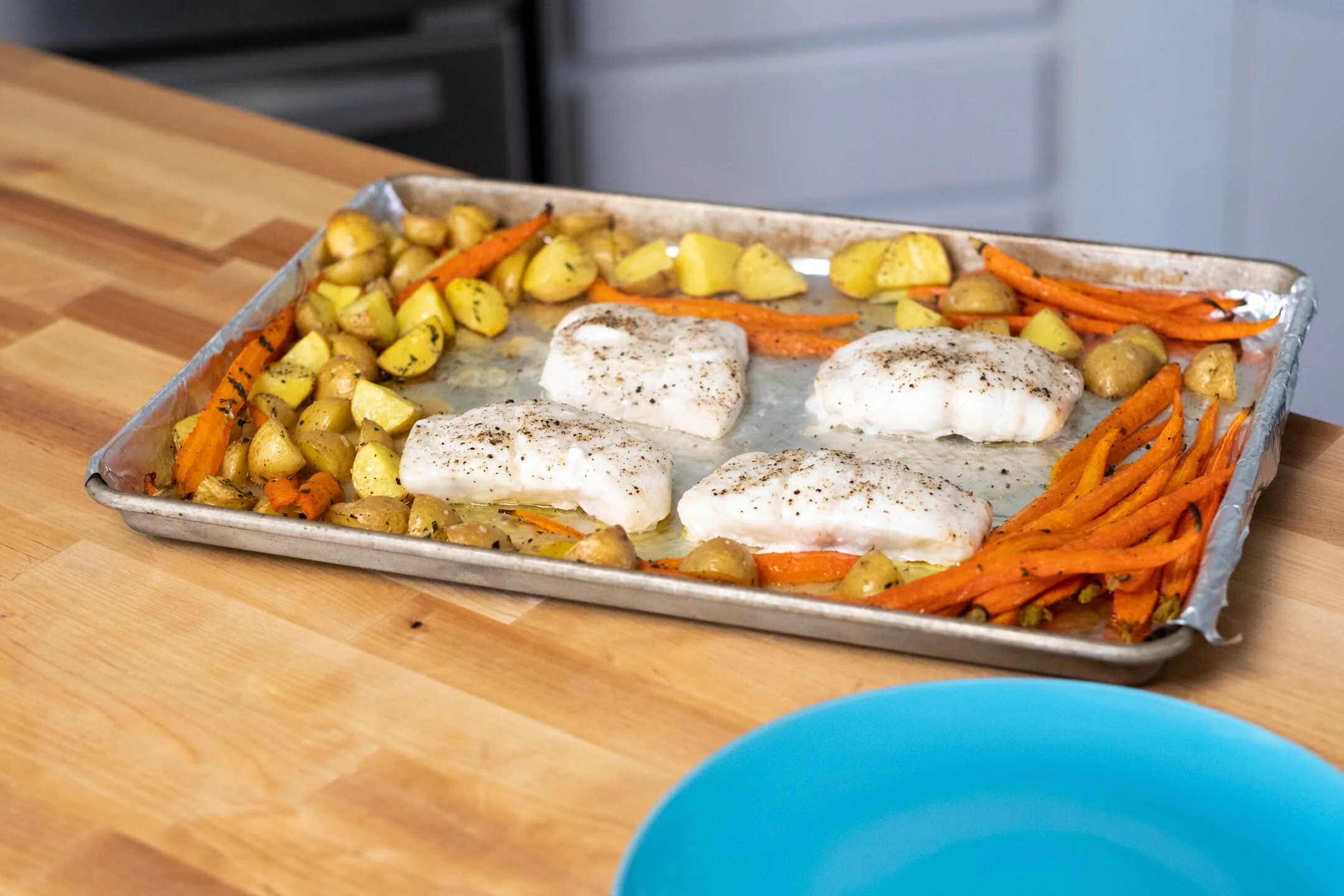 Baked Atlantic Cod with Spring Potatoes and Carrots — Iceland Catch