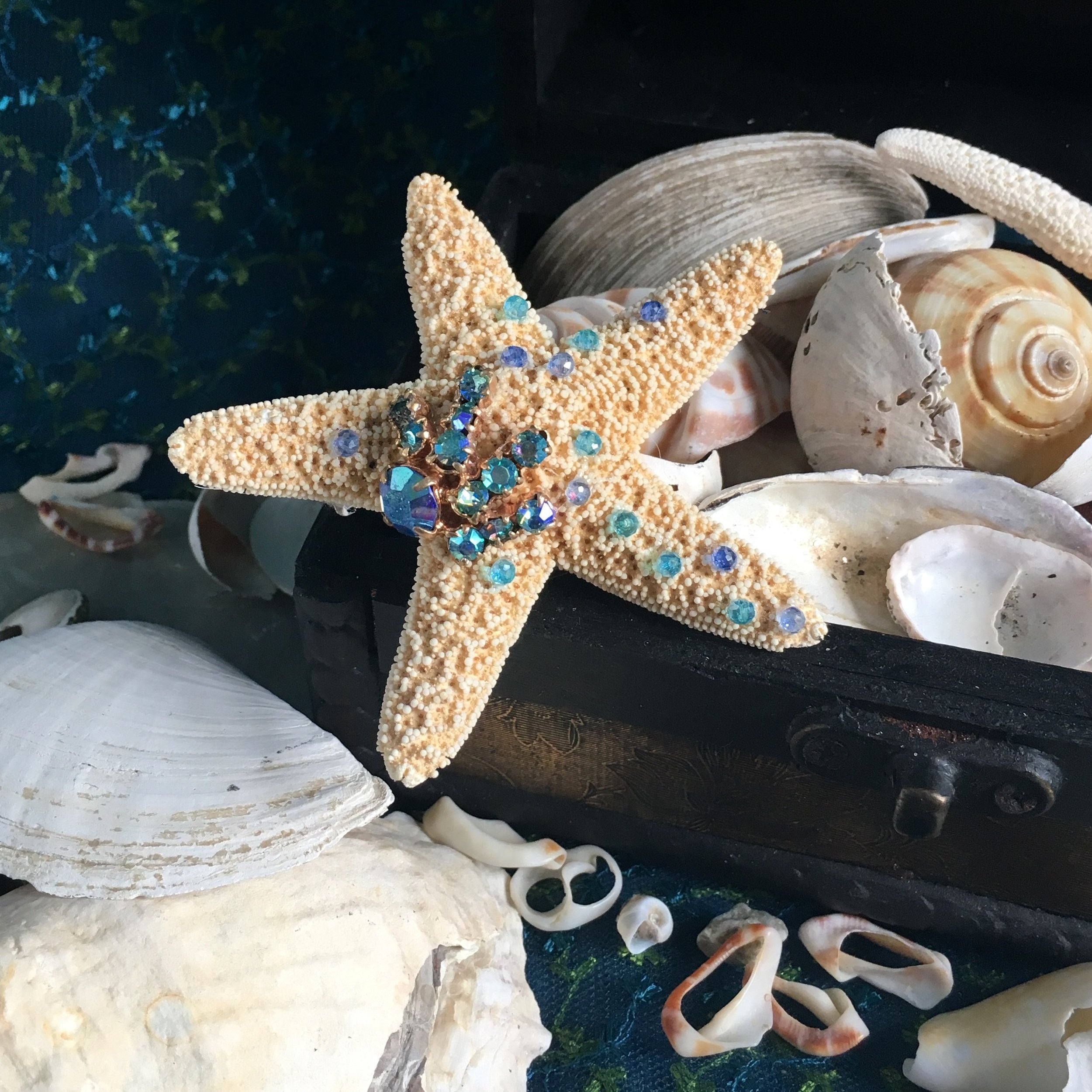 mermaids, flowers, and sale items — the Curious Nixie