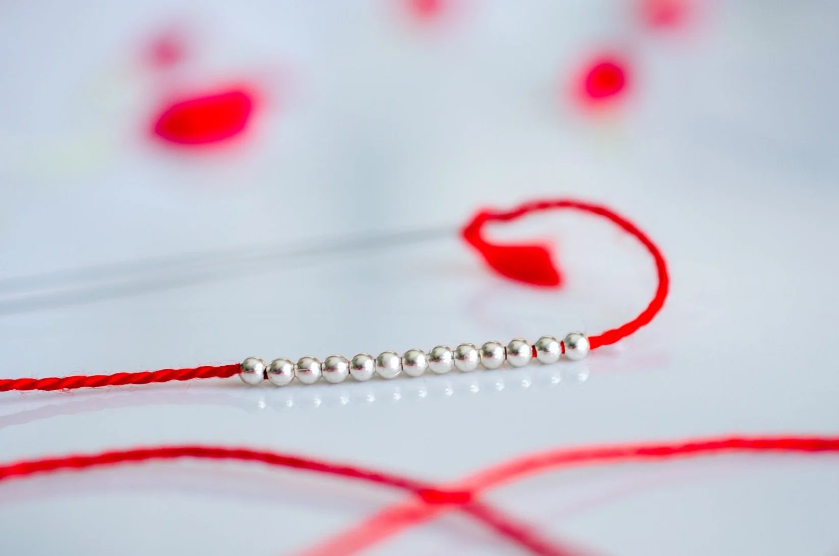 DIY: Red thread bracelets with seed beads — Our Happy Tribe