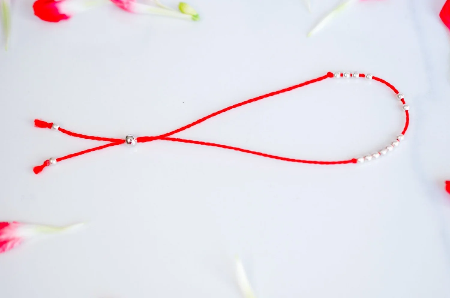 DIY: Red thread bracelets with seed beads — Our Happy Tribe