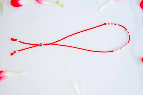 DIY: Red thread bracelets with seed beads — Our Happy Tribe