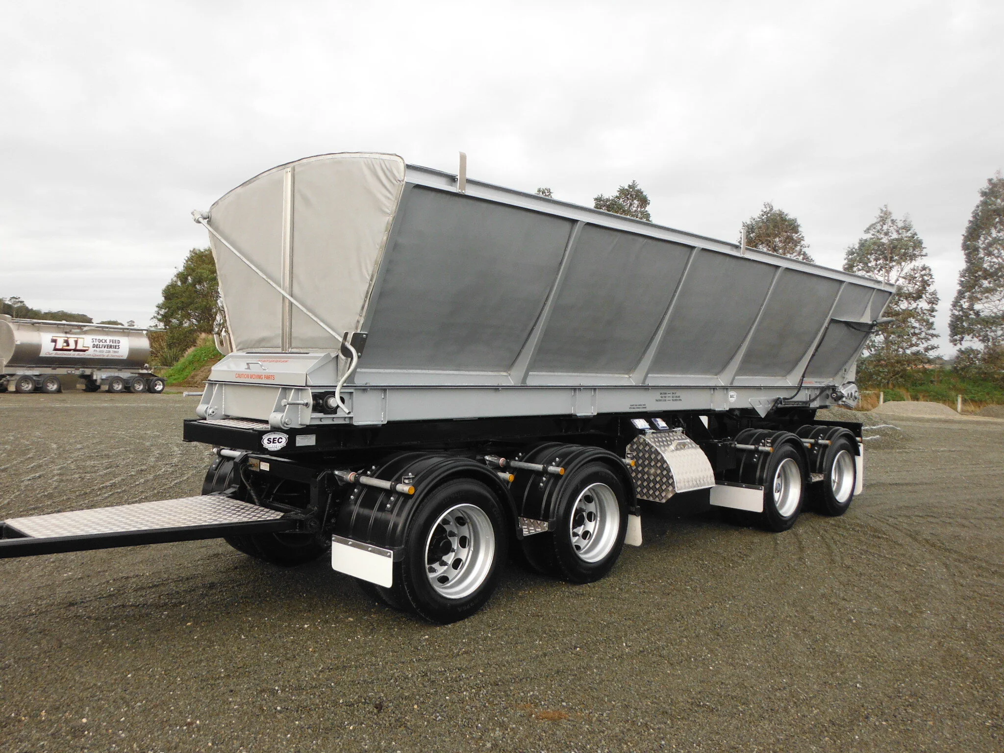 SPEC ASPHALT AUTO-UNLOADERS — SEC