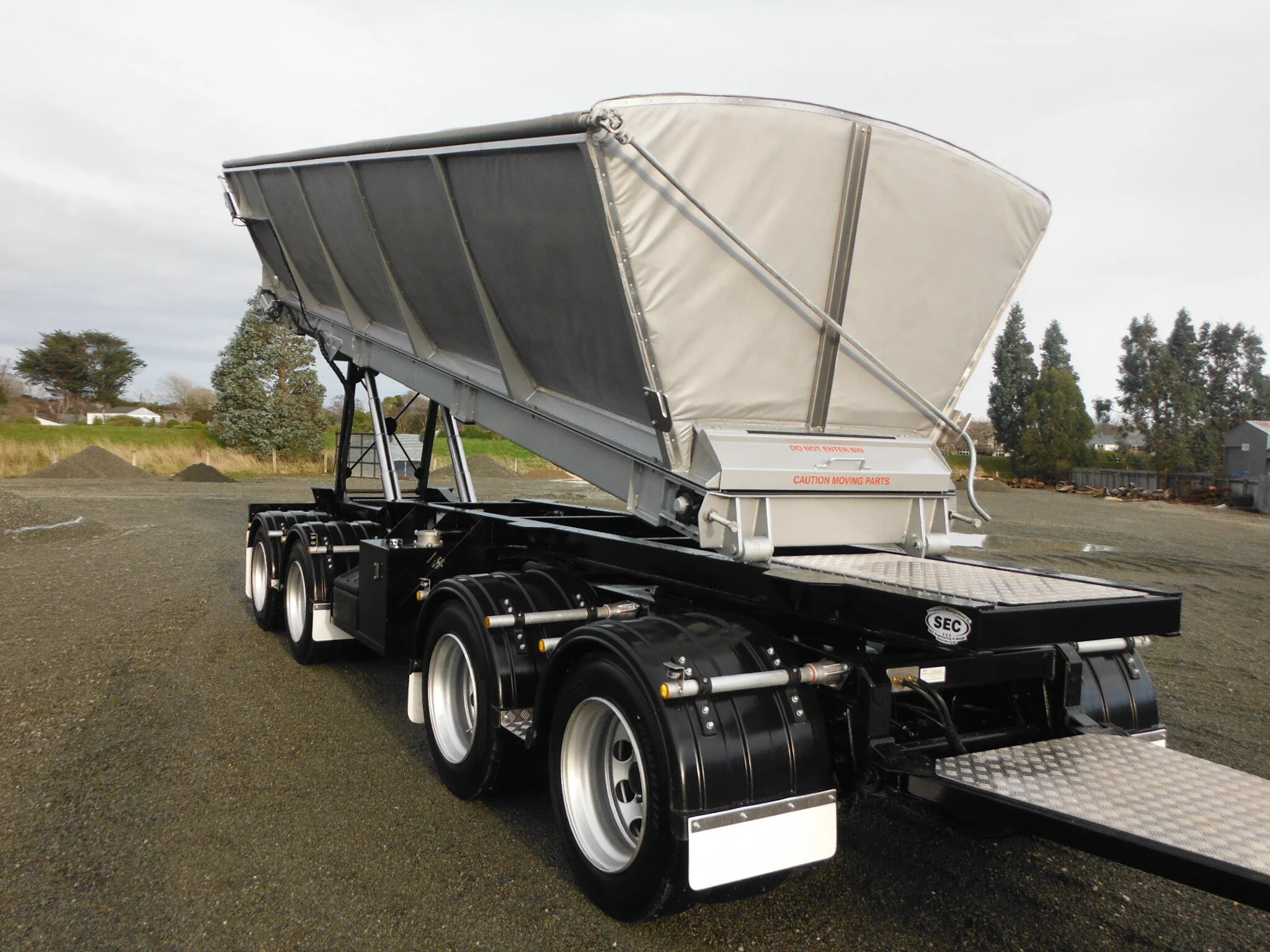 SPEC ASPHALT AUTO-UNLOADERS — SEC