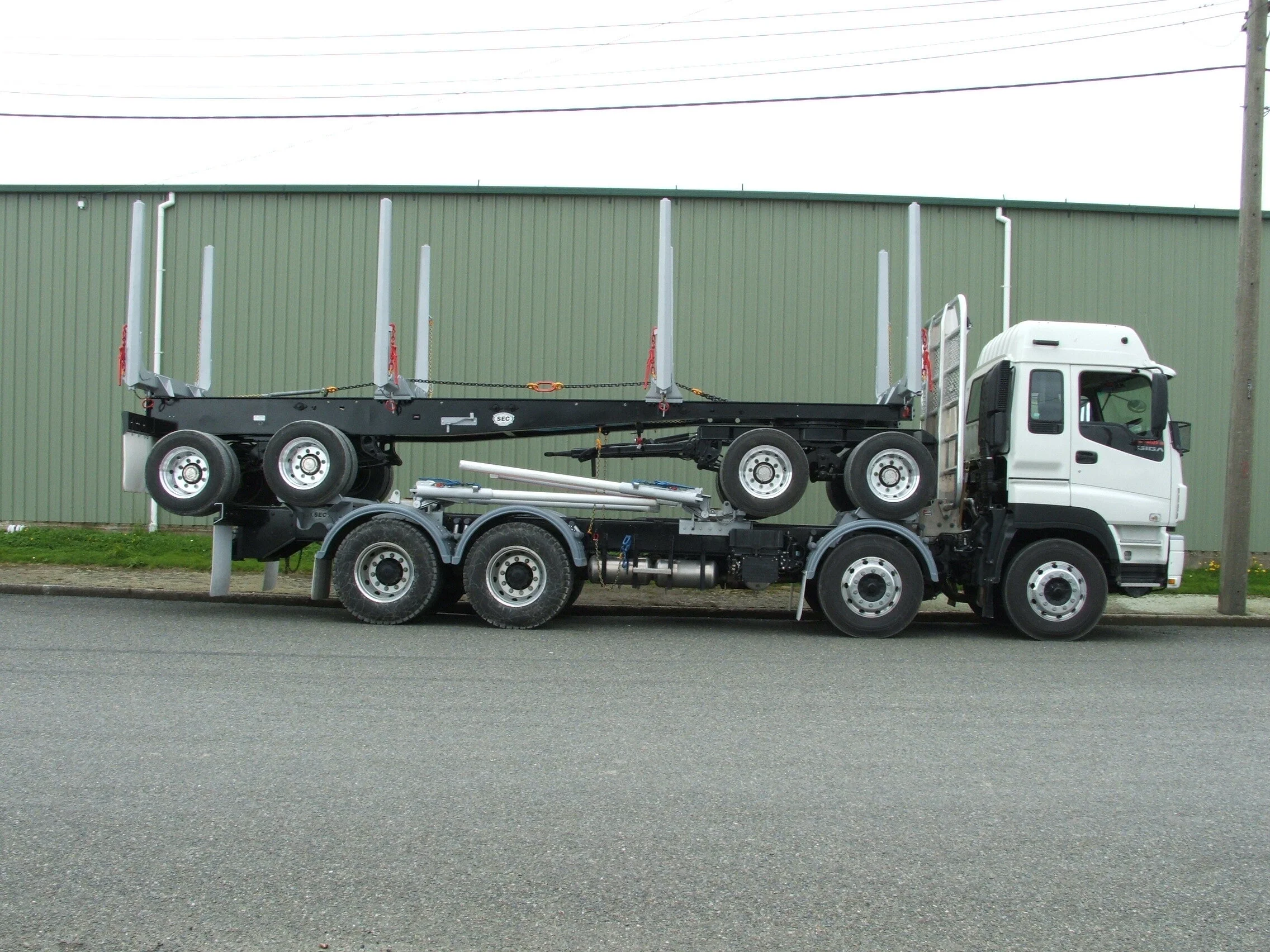 SPEC LOG TRAILERS — SEC