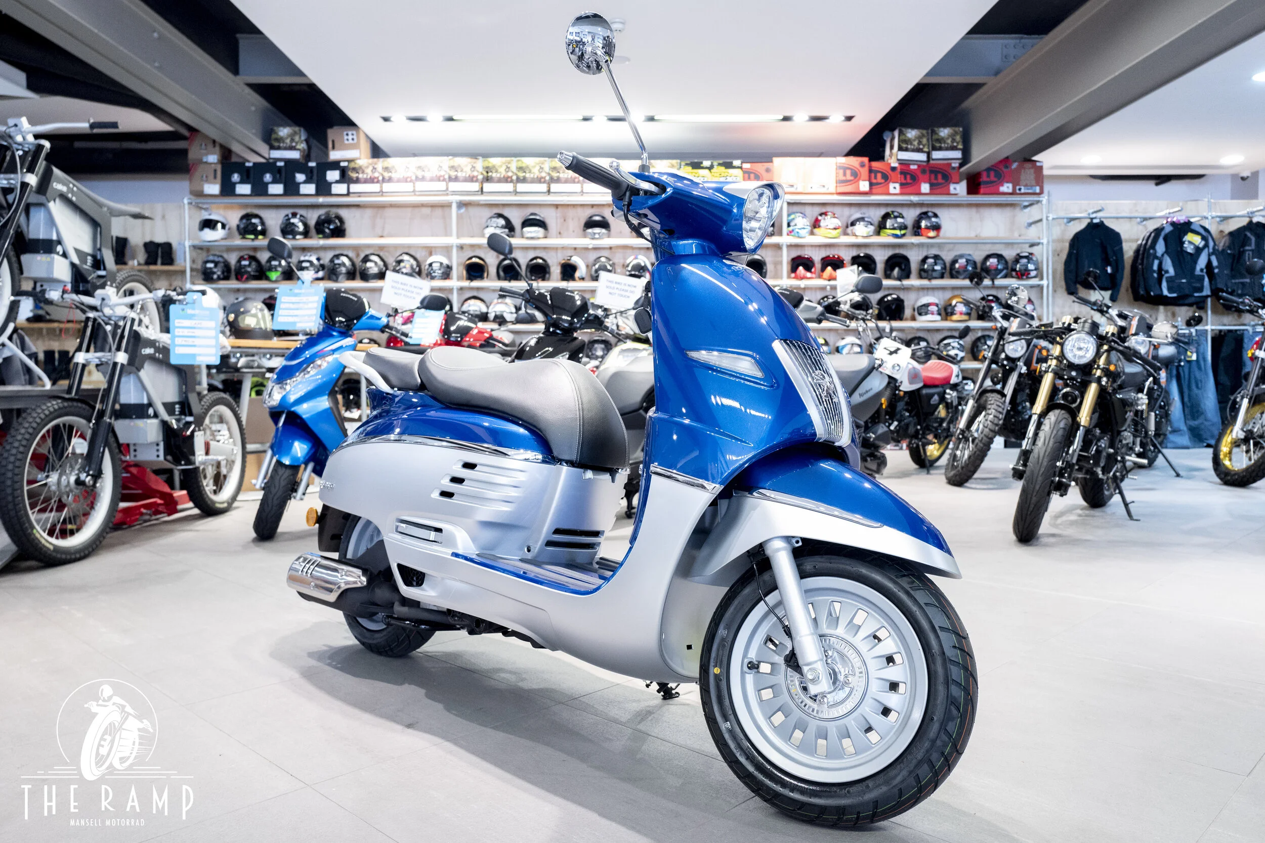 Peugeot Scooters — The Mansell Collection