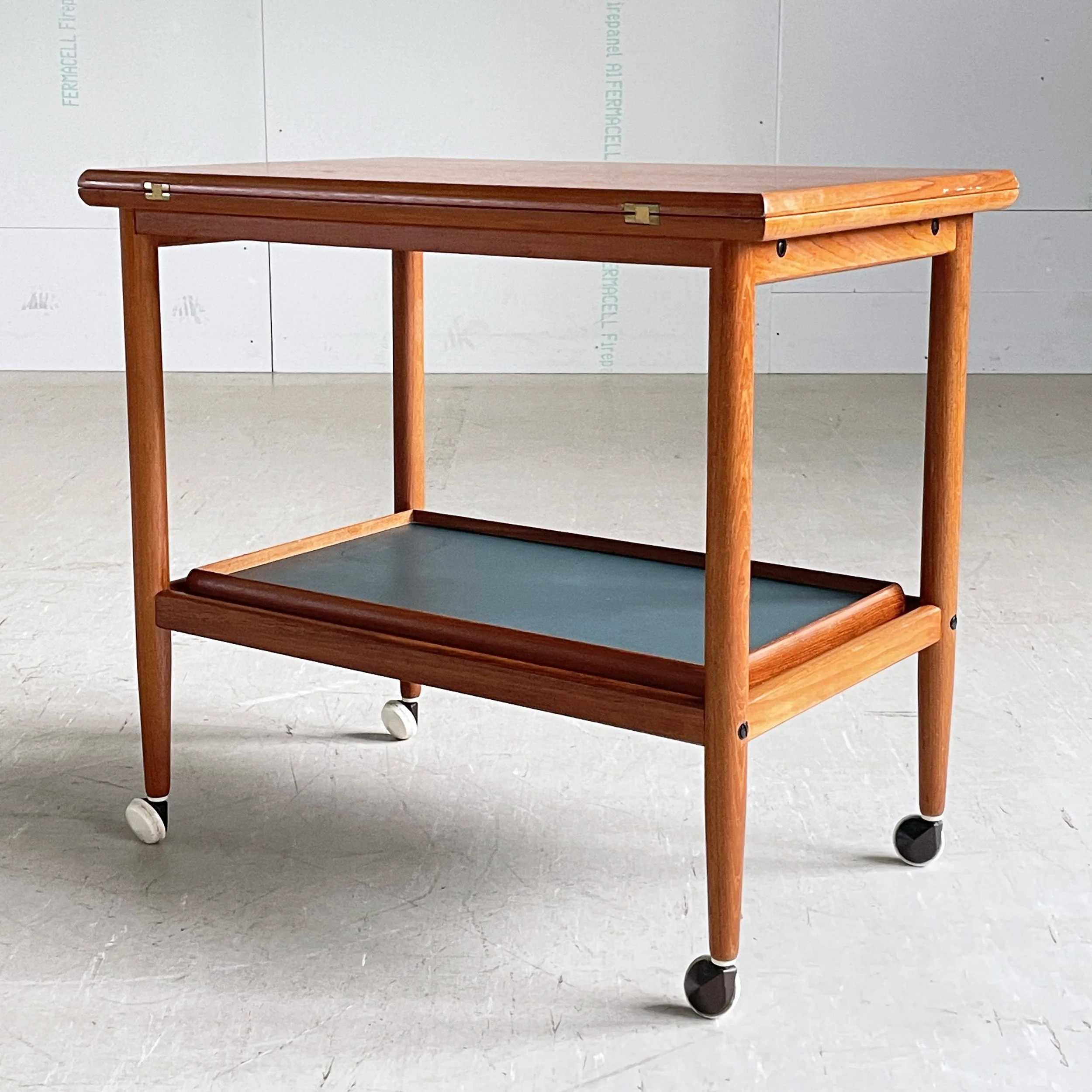 1960’s Grete Talk fold out teak service trolley/ table. Produced by ...