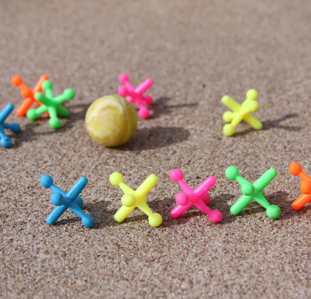 How To Play Jacks - Game Rules (with Video) — Gather Together Games