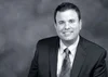Biography — Michael R. Strain