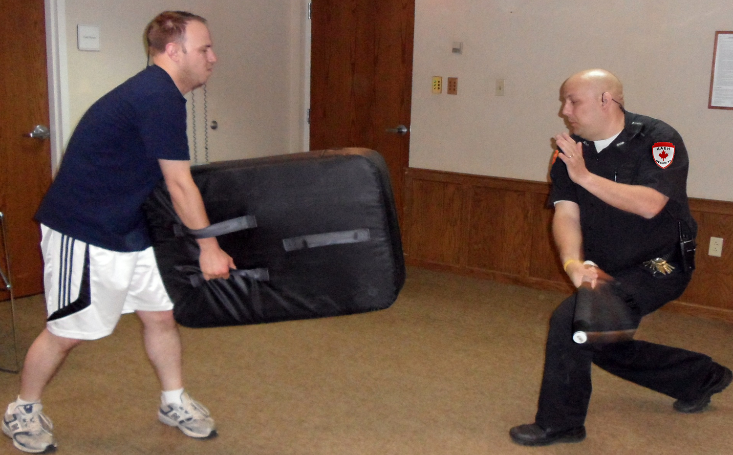 AAEH SECURITY - Handcuffing & Baton Training