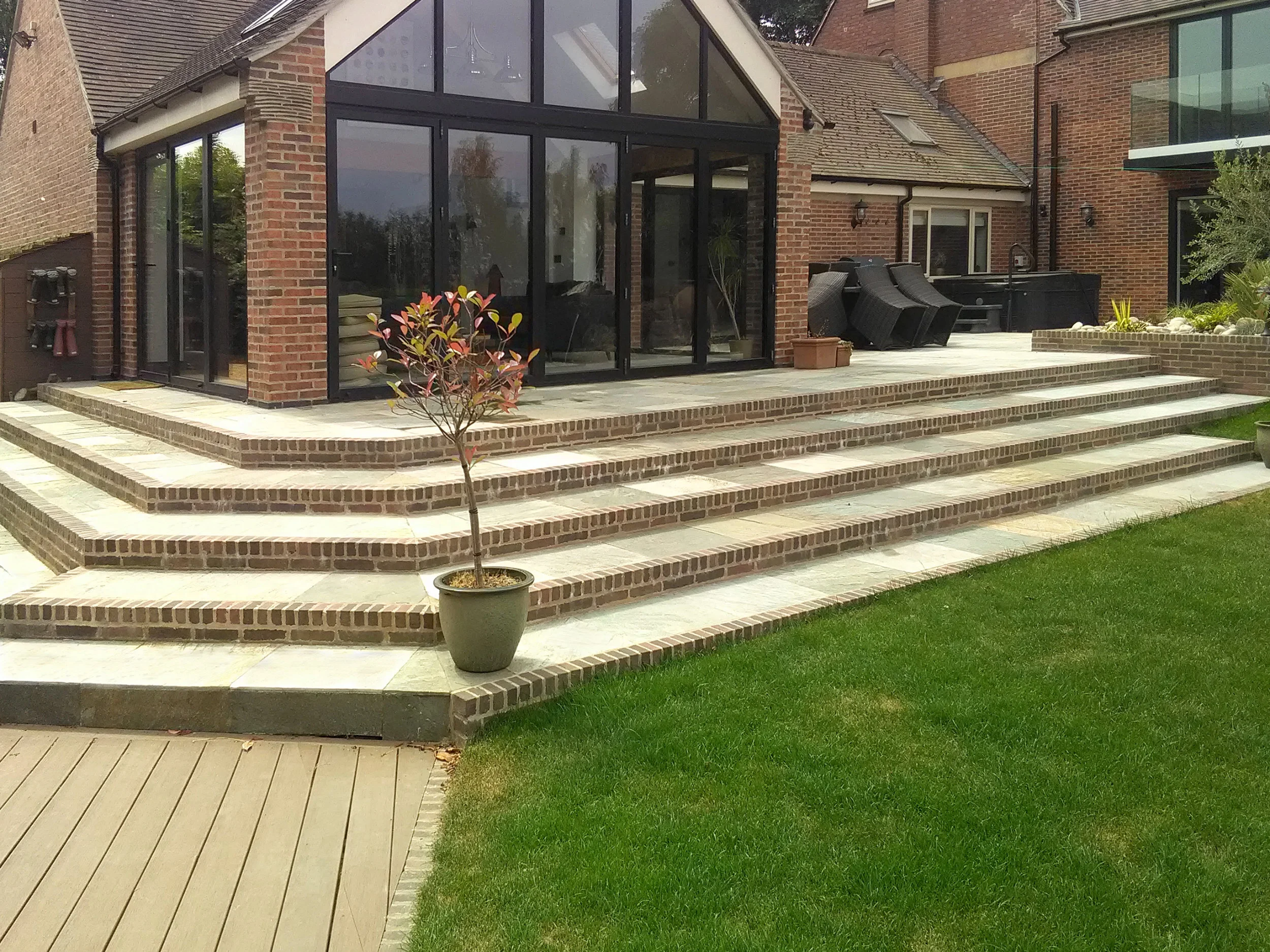 Sunken fire pit and stepped terrace — Bottle Kiln Design