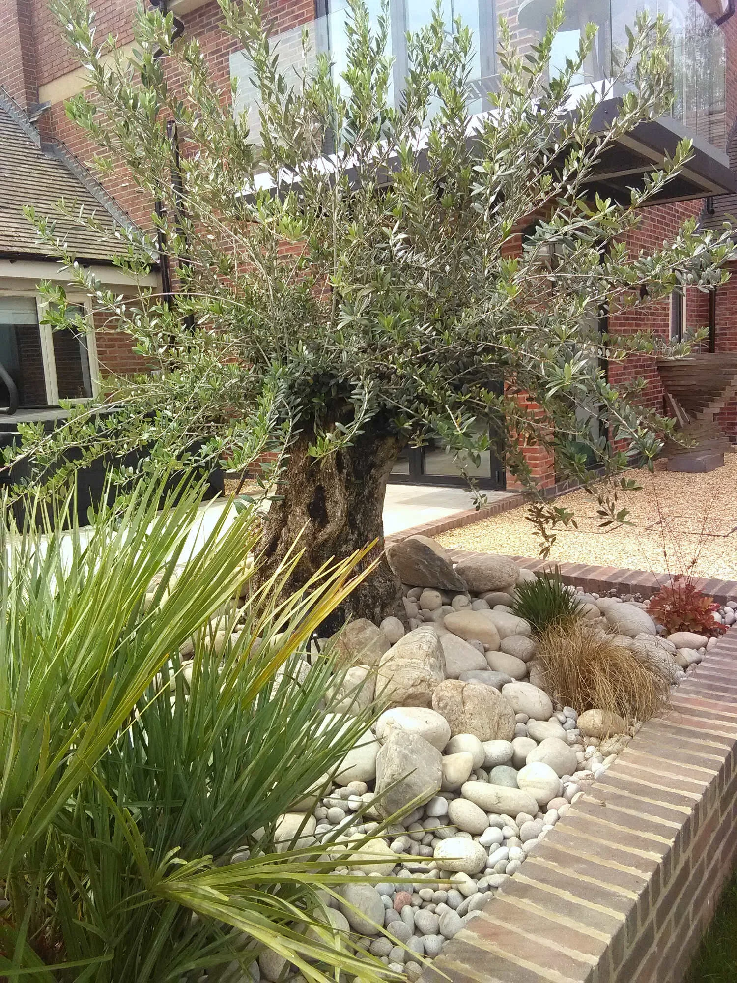 Sunken fire pit and stepped terrace — Bottle Kiln Design