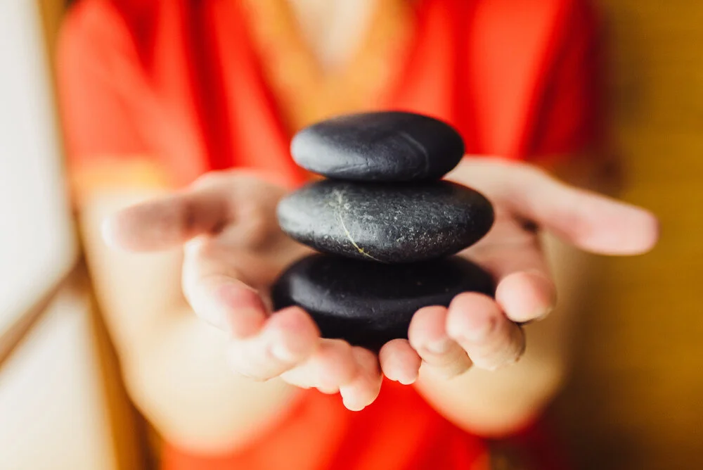 The Healing History of Hot Stone Massage — ZenLife Massage Therapy ...