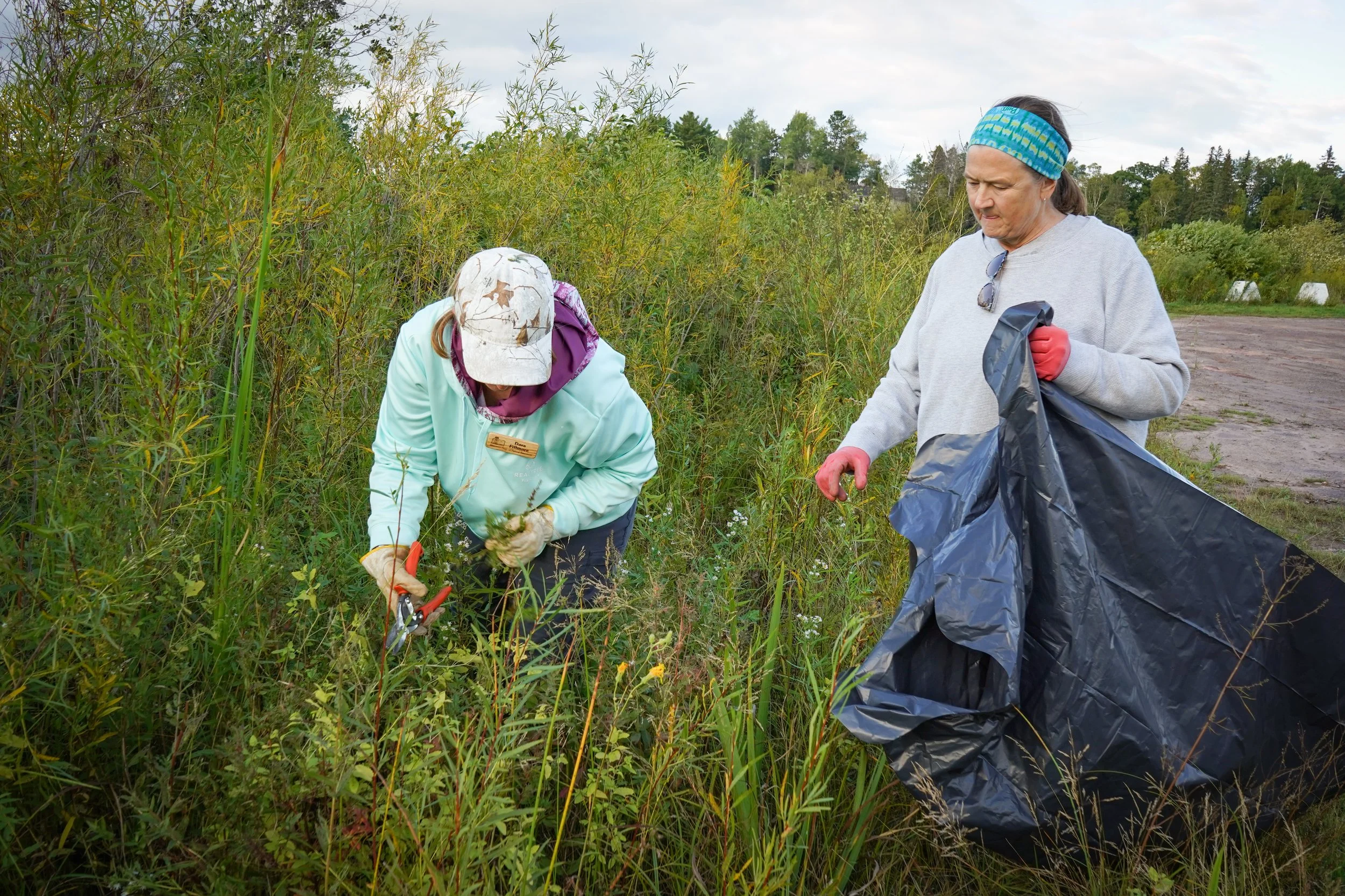 SLRA Hosts Invasive Species Removal and Clean Up Woodstock Bay Landing ...