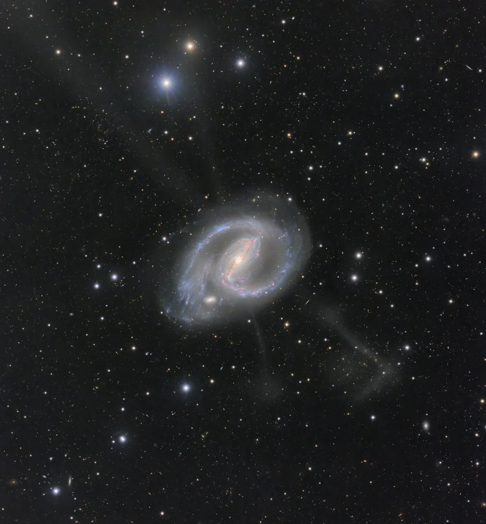 NGC 1097 - a barred spiral galaxy in Fornax, featuring multiple linear ...