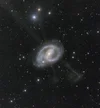 NGC 1097 - a barred spiral galaxy in Fornax, featuring multiple linear star streams — AAPOD2.COM
