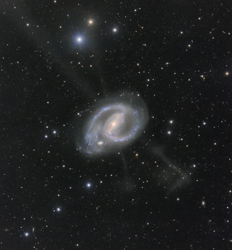 NGC 1097 - a barred spiral galaxy in Fornax, featuring multiple linear ...