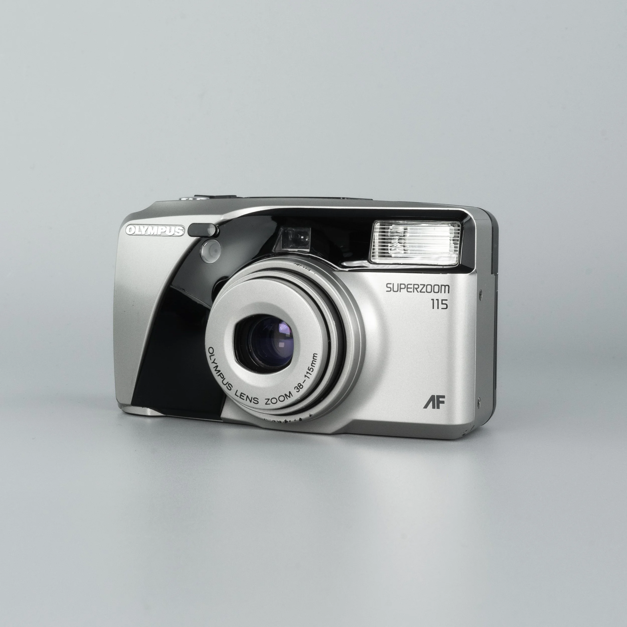 Olympus Superzoom 115 — LensFayre