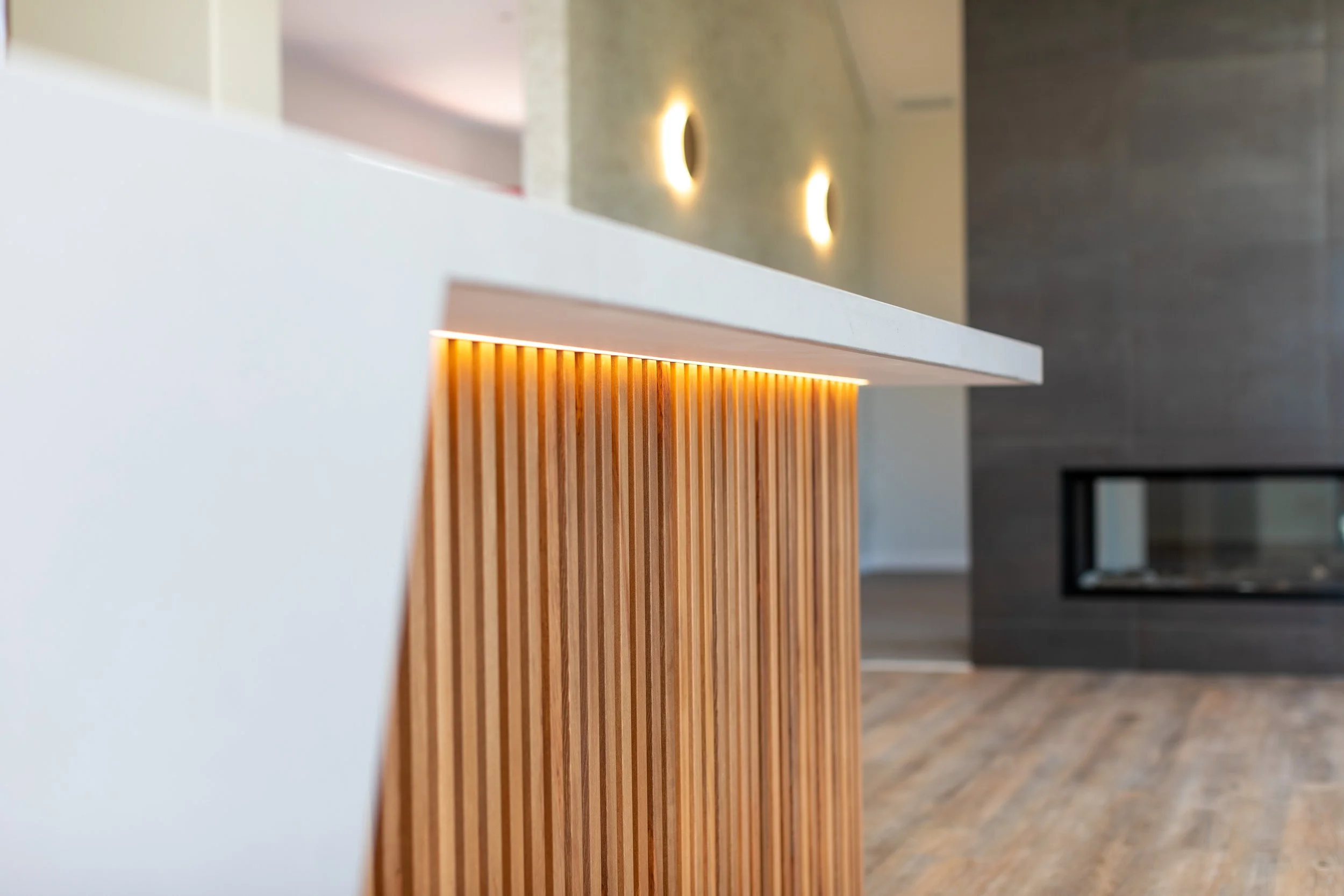 NZ Native Rimu battens and shelves complement this raw concrete ...