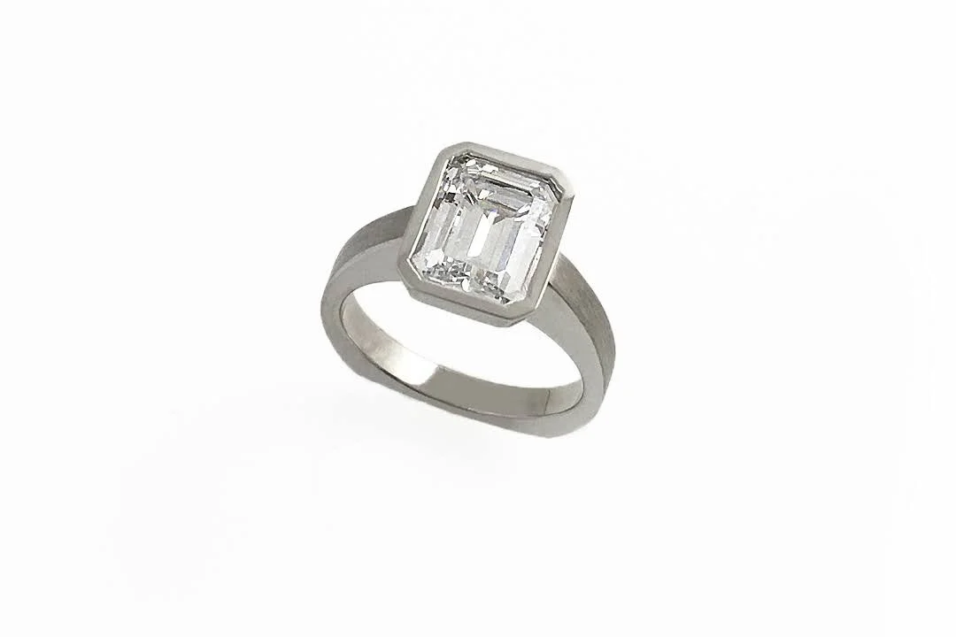 Emerald Bezel Solitaire Ring — Claudia Endler Designs
