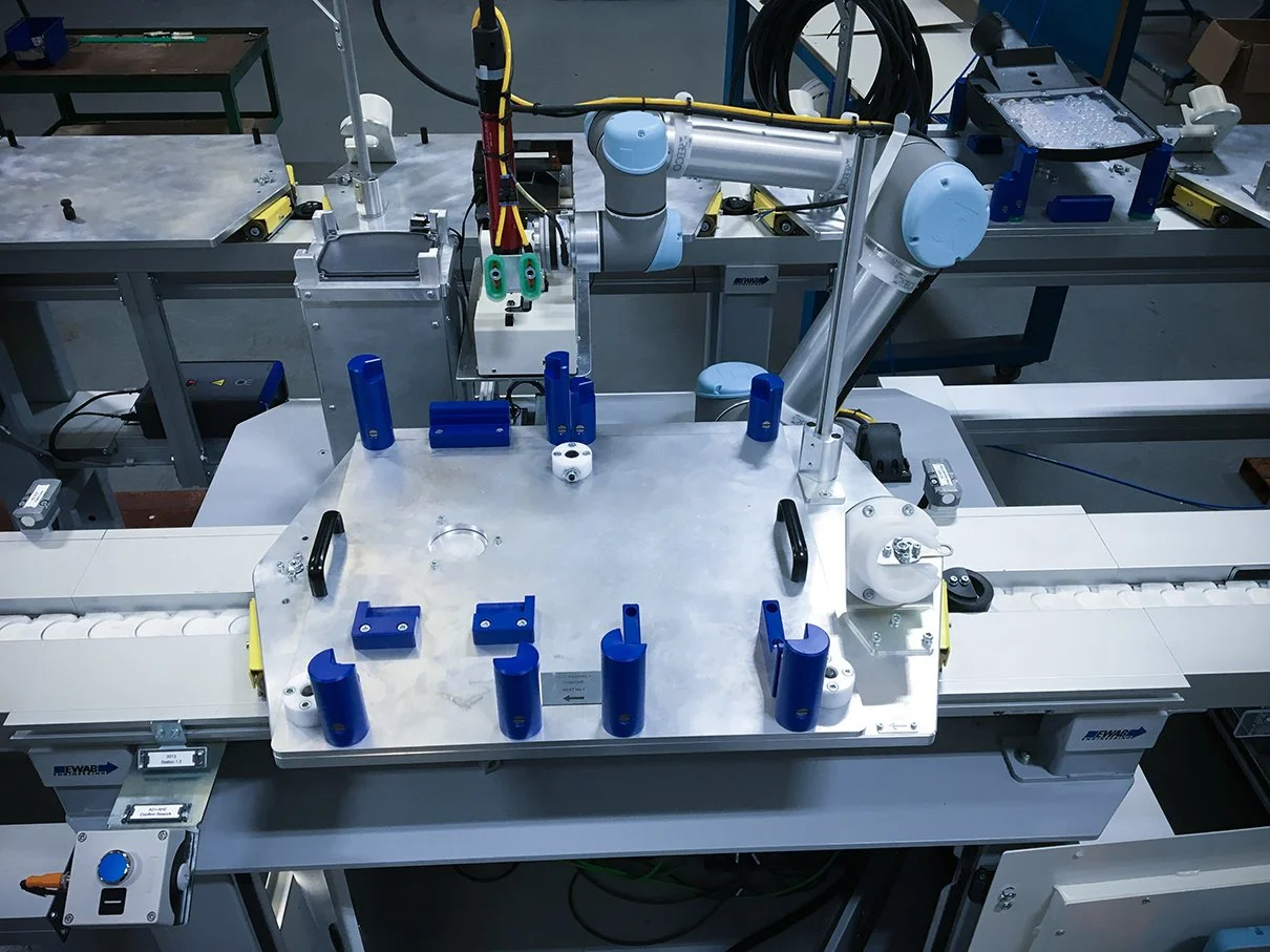 Cobot integrations — EWAB Conveyor Automation Systems