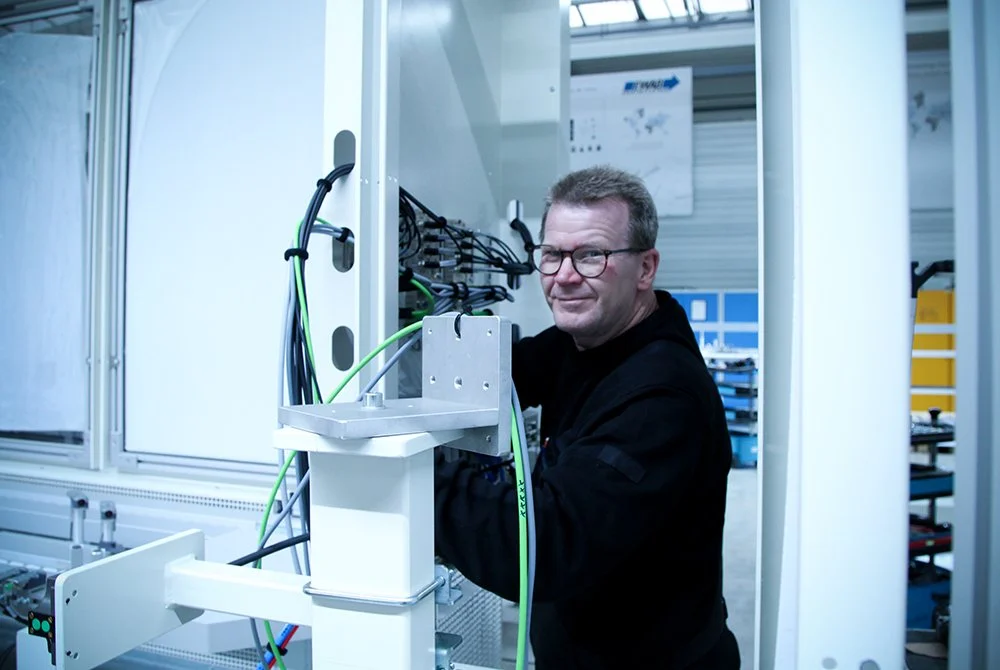 We design and build — EWAB Conveyor Automation Systems