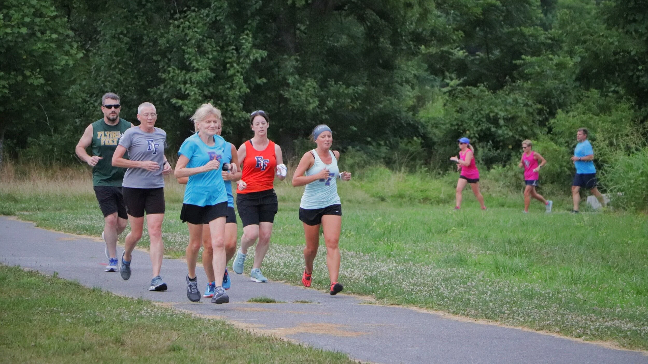 Who/What is Flying Feet? — Flying Feet Running