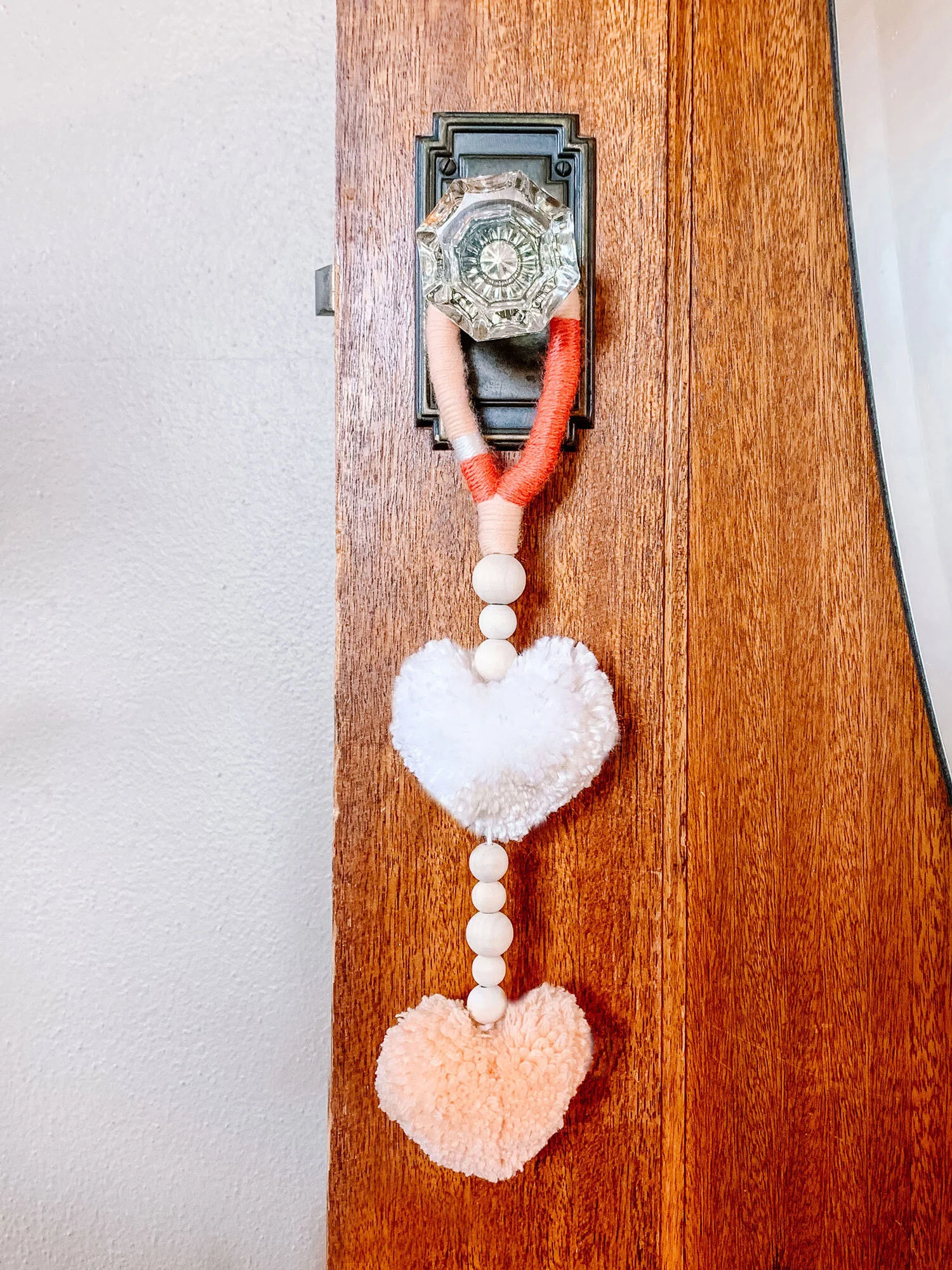 How To Make A Heart Pom Door Hanger The Green Mad House how-to-make-a-heart-pom-door-hanger-the-green-mad-house