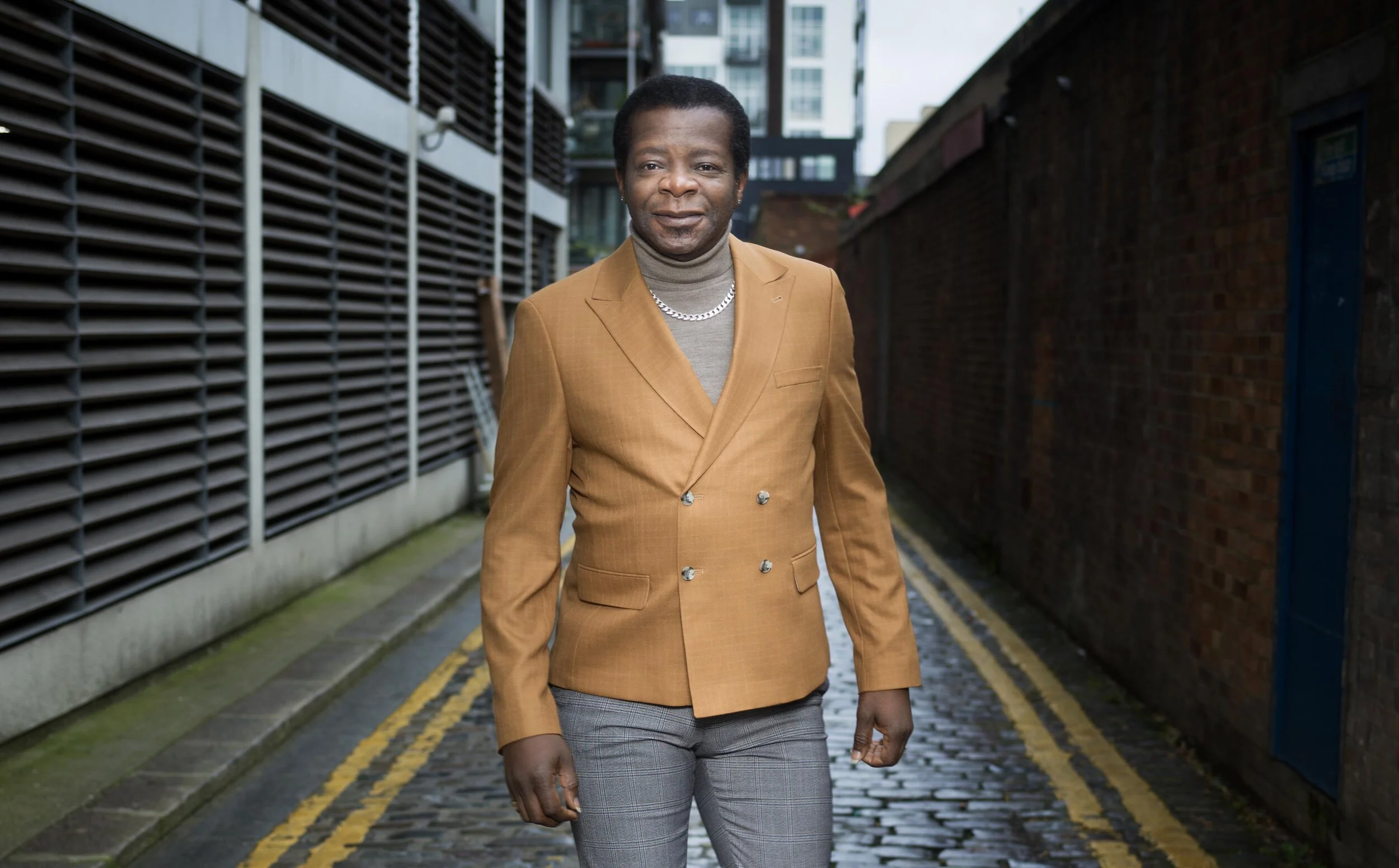 Stephen K Amos
