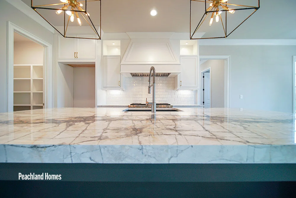 Peachland Homes — The Cottages at The Manor Golf and Country Club